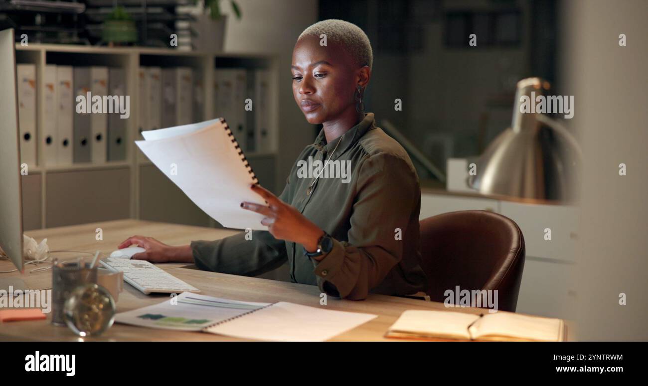 Night, business and black woman with documents, reading and planning ...