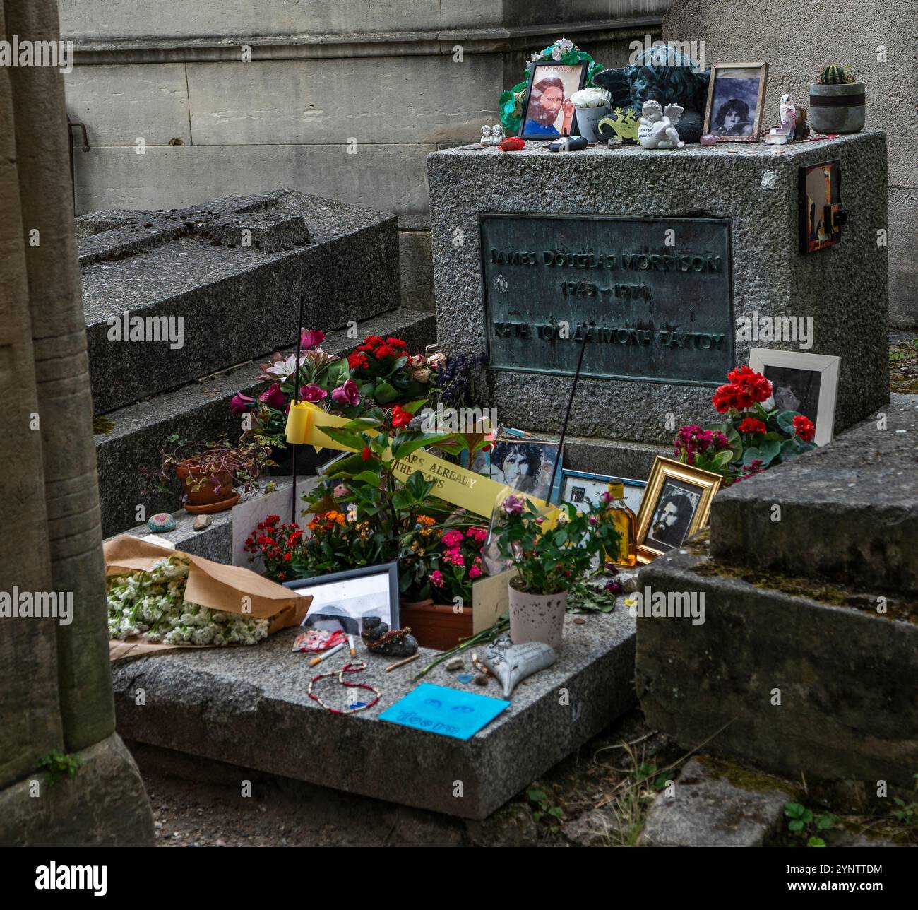 Jim Morrison's grave at Pere Lachaise Cemetery on a sunny summer day ...