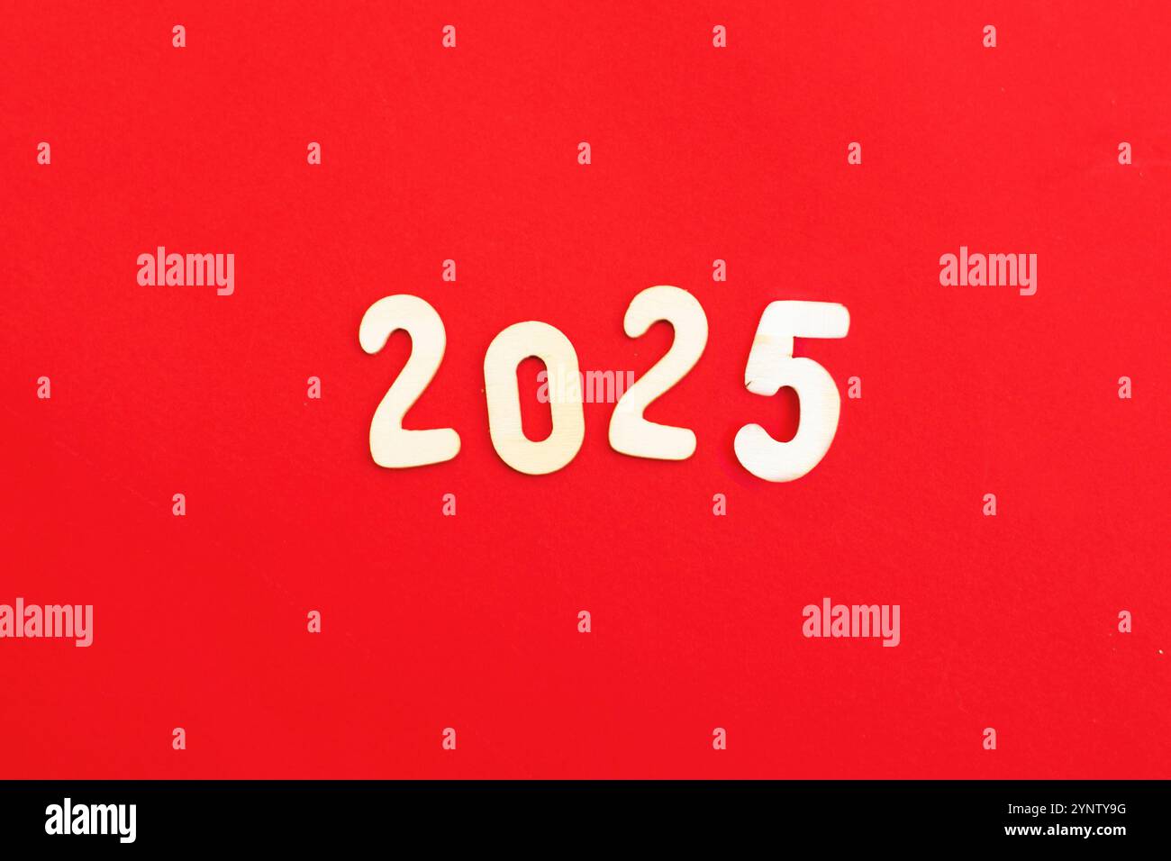 Wooden numbers 2025 on red background. Christmas, New Year, winter ...