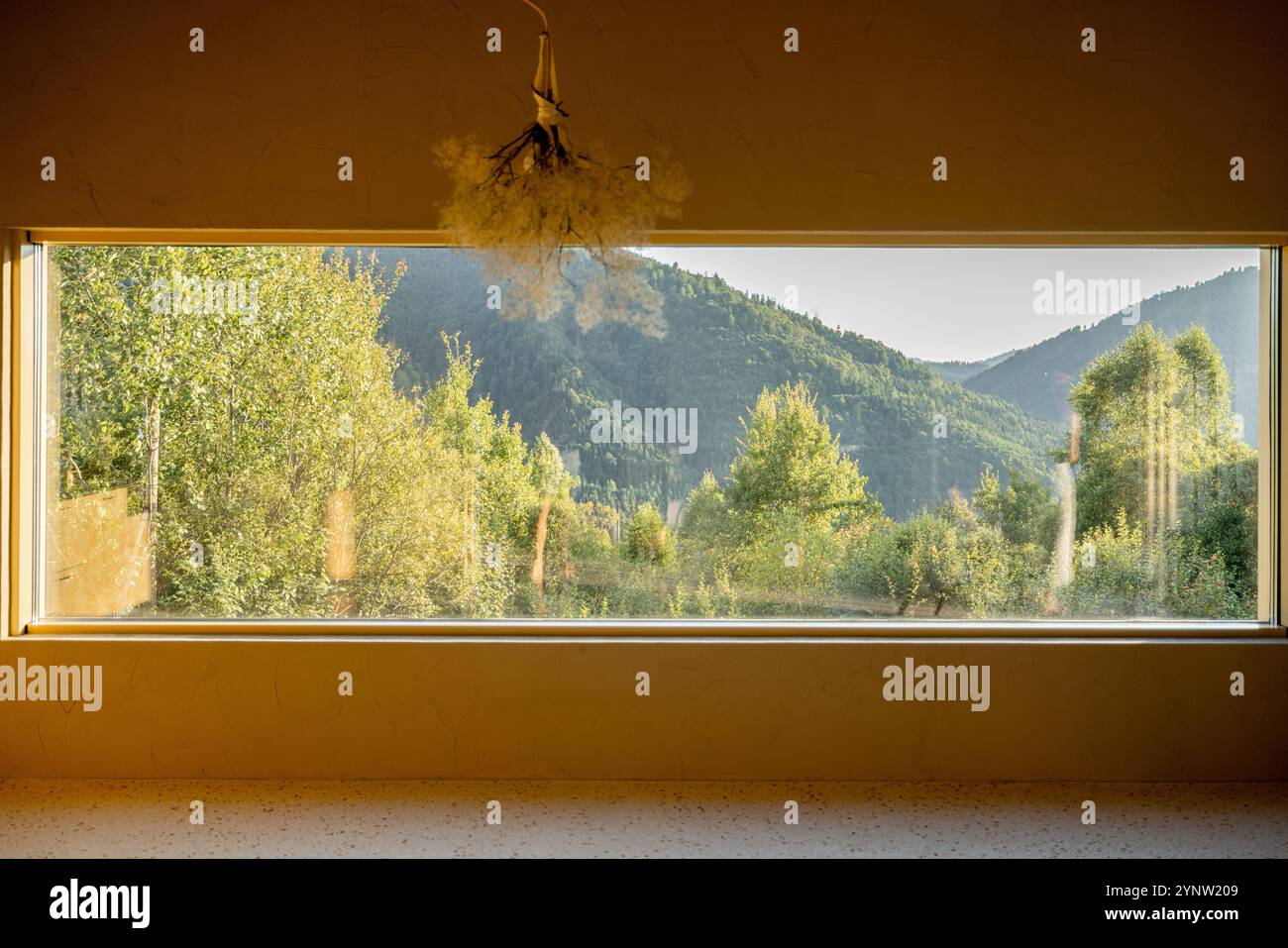Mountain View Through Large Window Stock Photo - Alamy