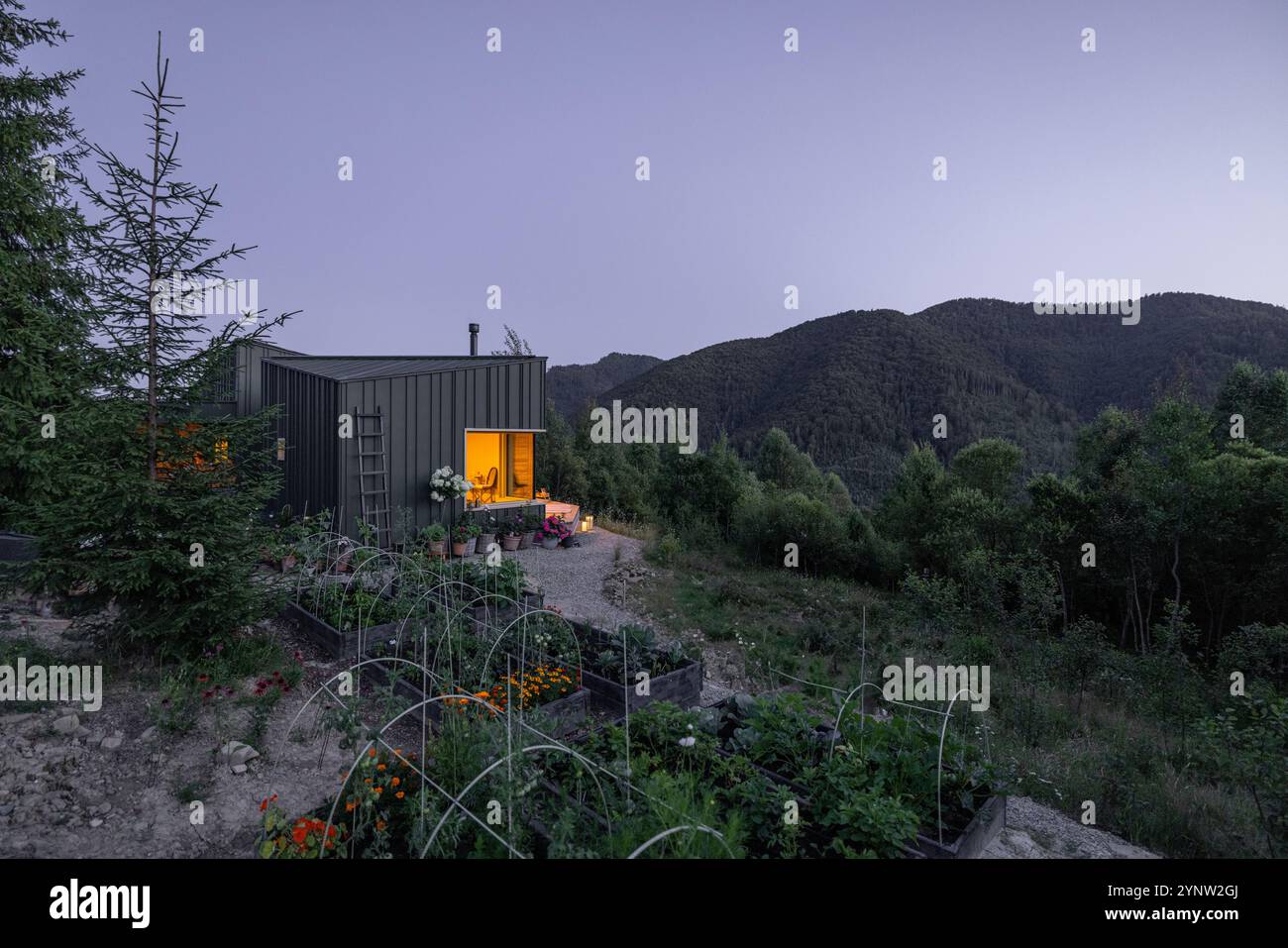 Evening Cabin Glow Stock Photo - Alamy
