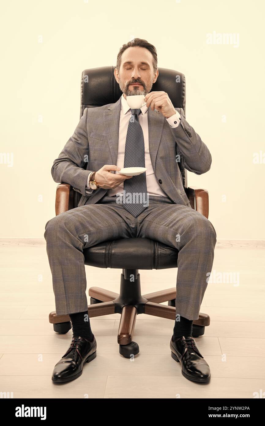 successful businessman man in boss office shows business success and ...