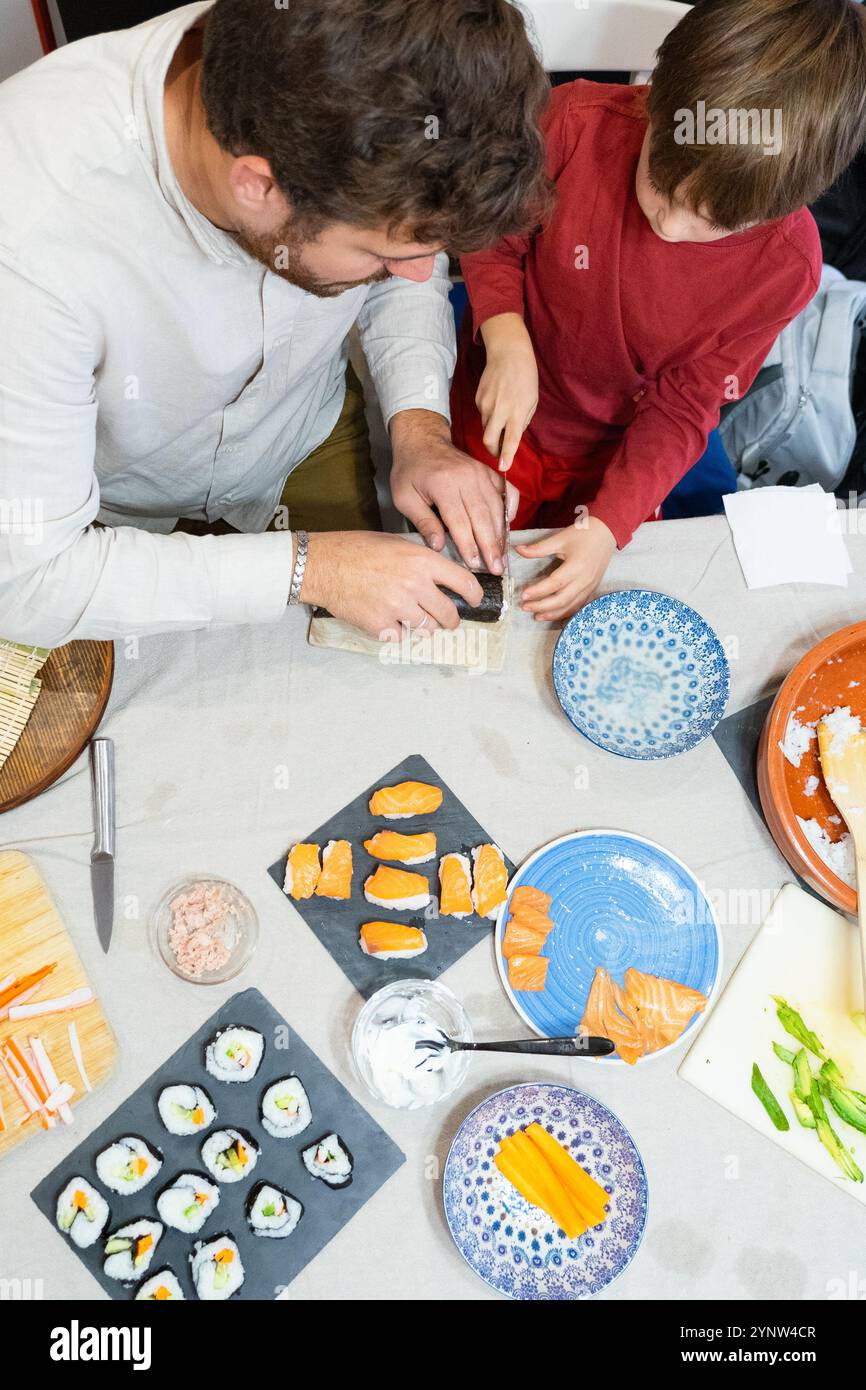Father and son cooking sushi hi-res stock photography and images - Alamy