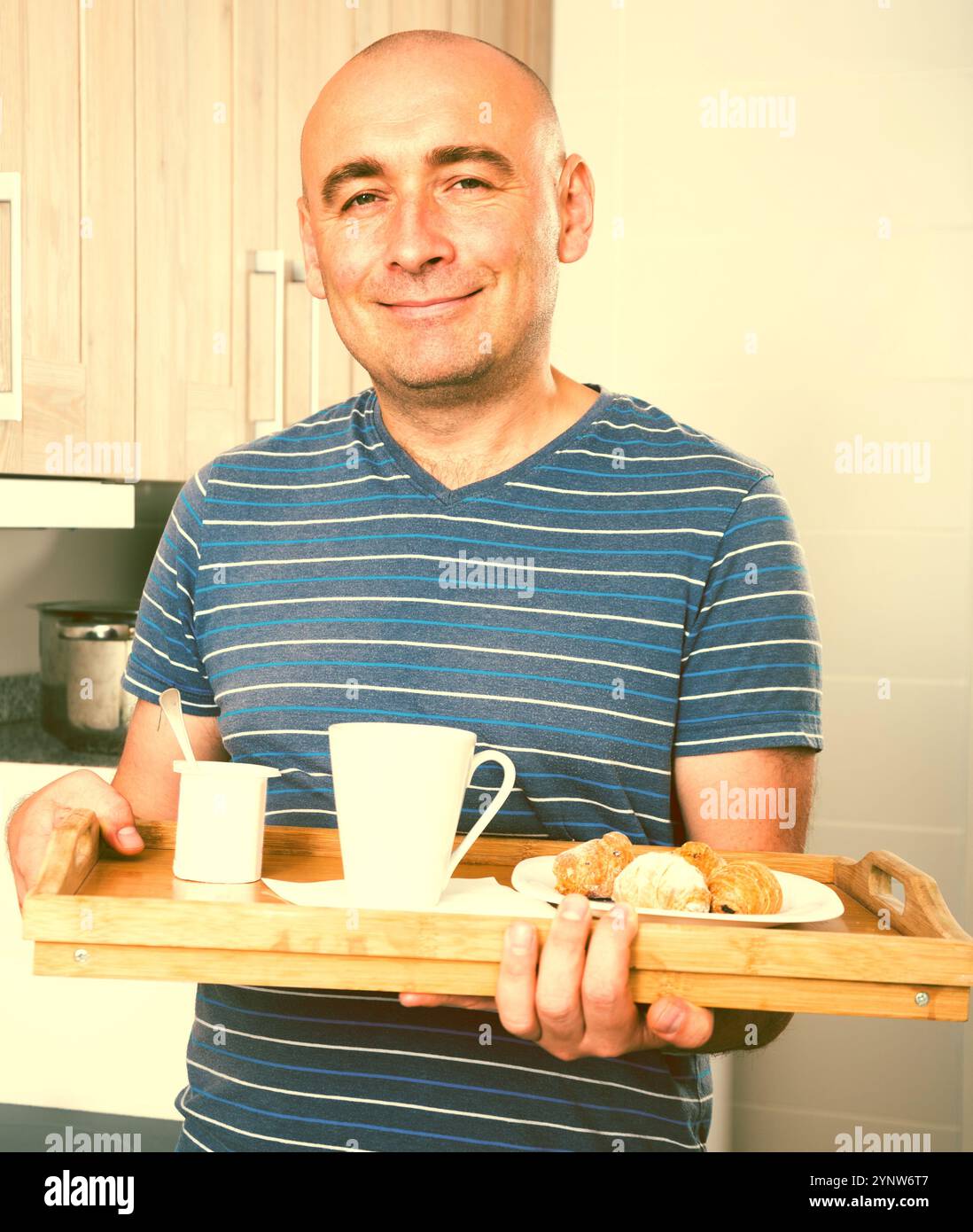 Guy made breakfast for his wife Stock Photo - Alamy