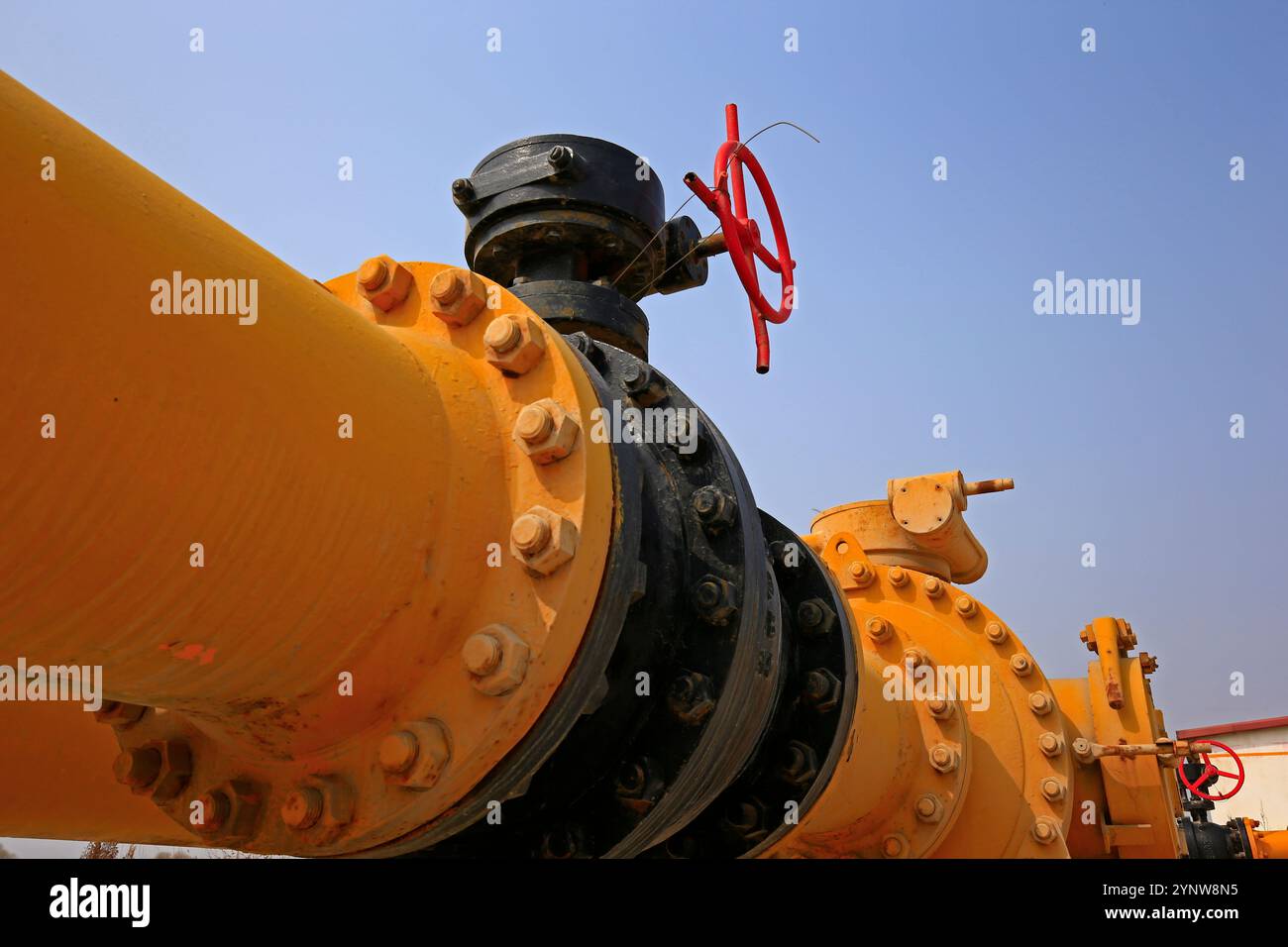 Oil pipes and valves Stock Photo - Alamy