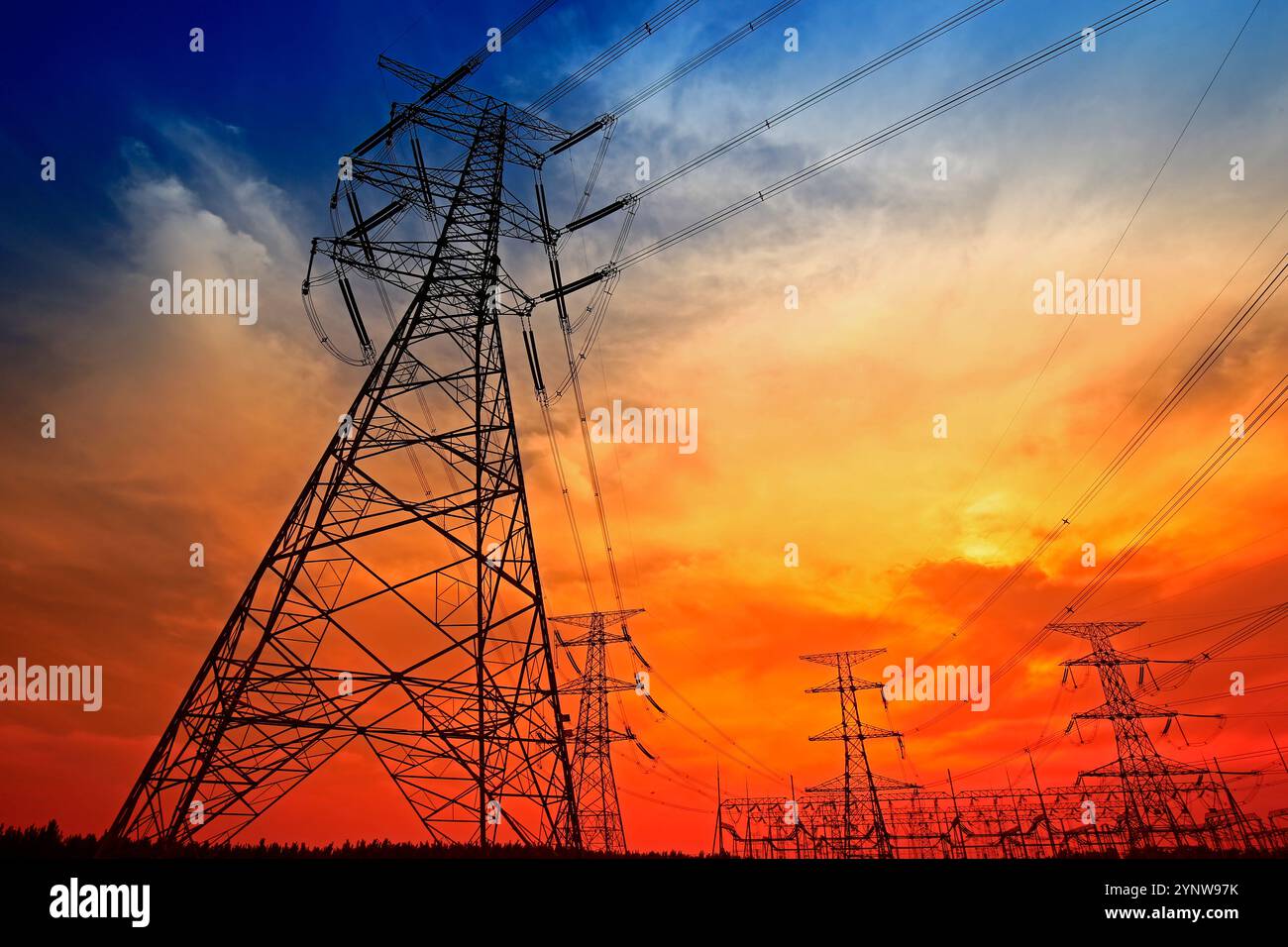 Electric tower, silhouette at sunset Stock Photo - Alamy