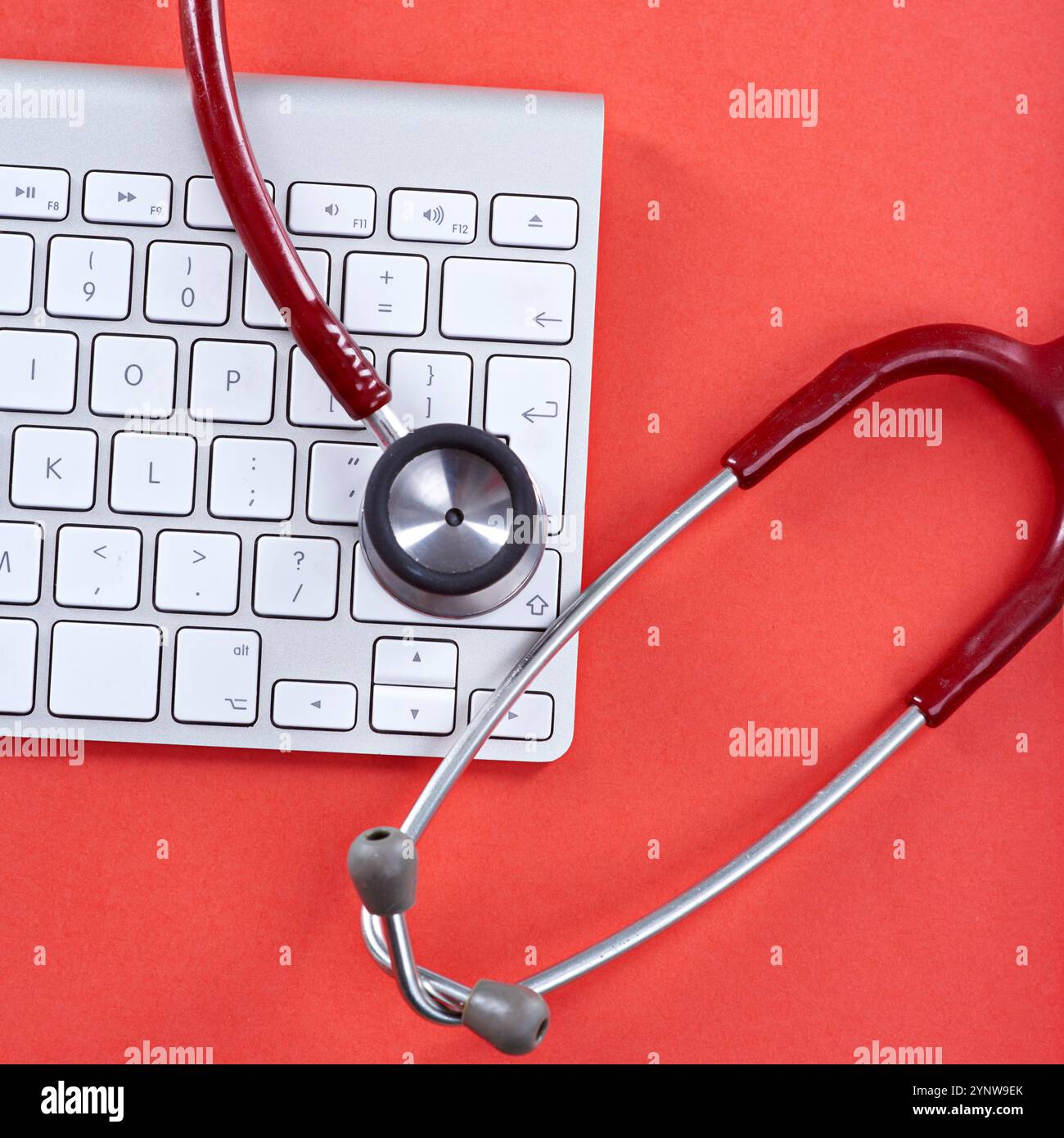 Keyboard, stethoscope and diagnostic in studio for service, IT support ...