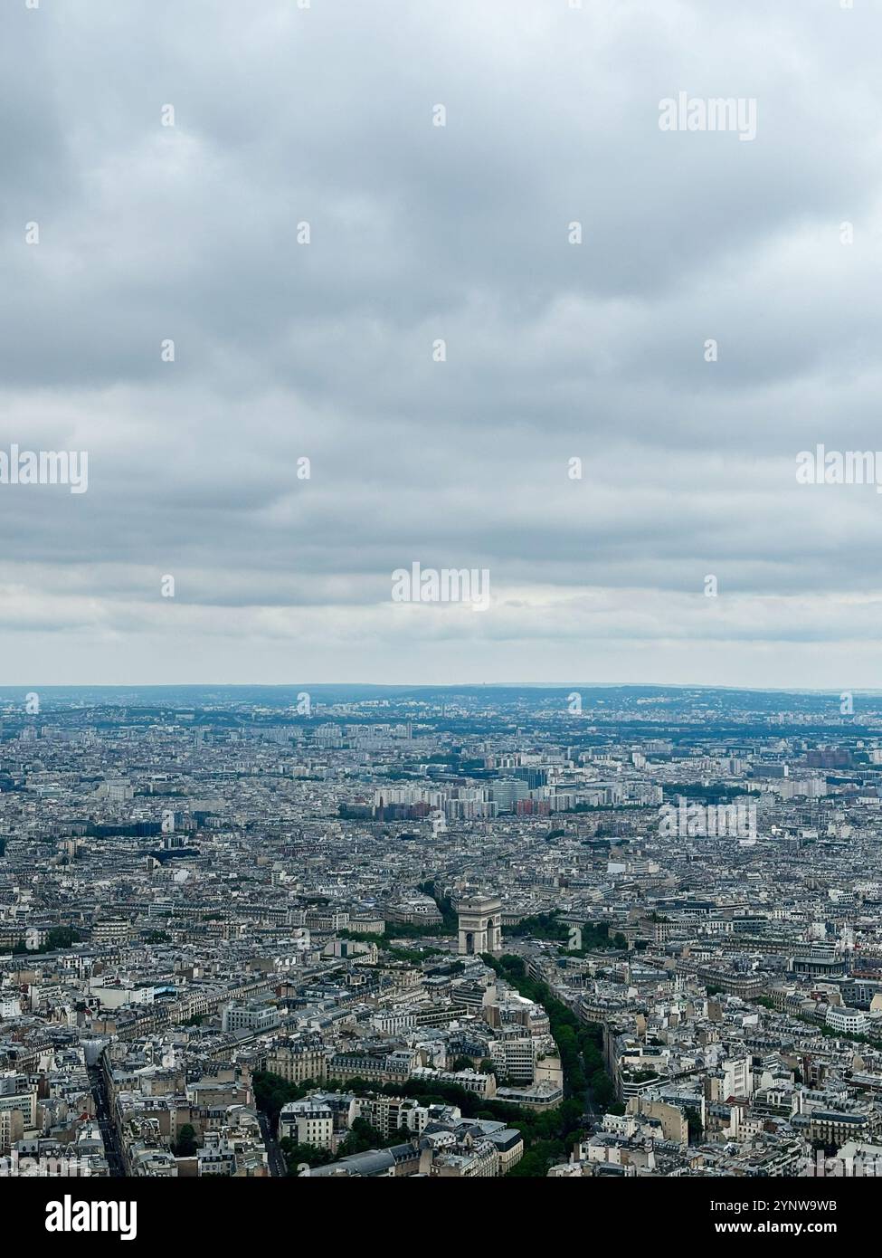 Aerial view of Paris cityscape featuring the iconic Arc de Triomphe ...