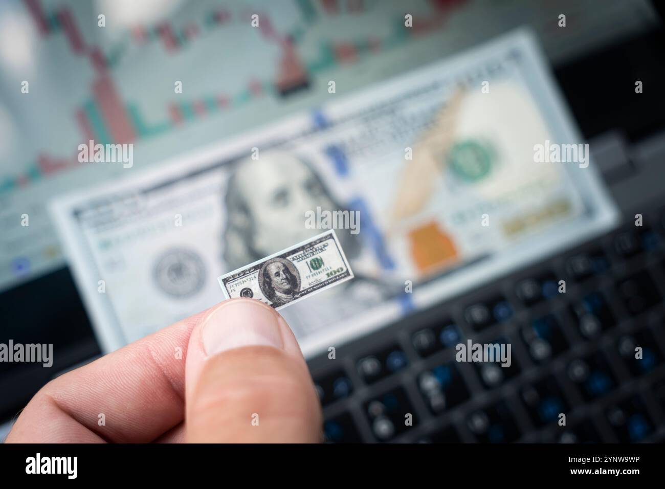 a small bill of one hundred dollars against the background of money and ...