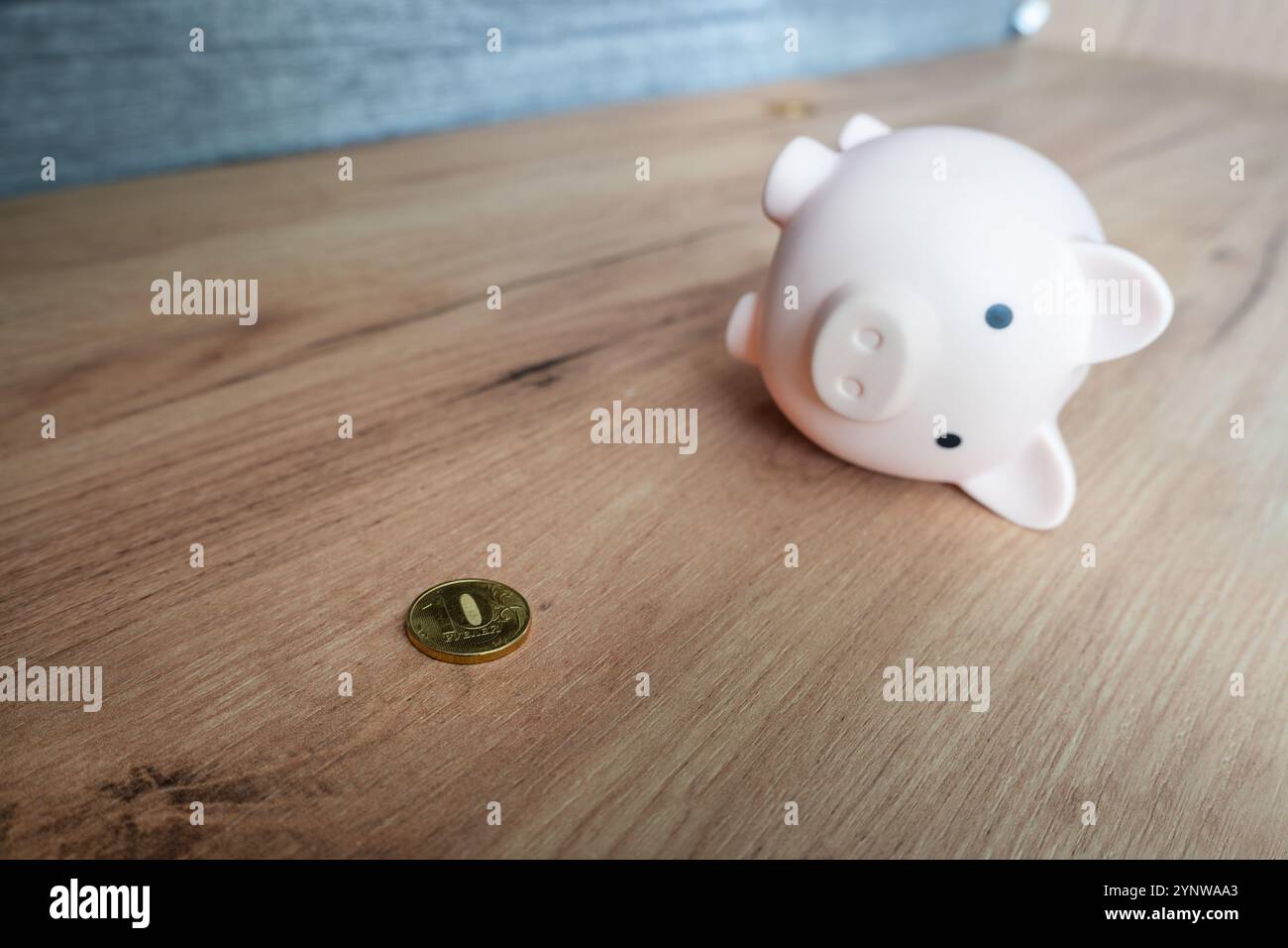 the last coin fell out of an inverted piggy bank. The concept of ...