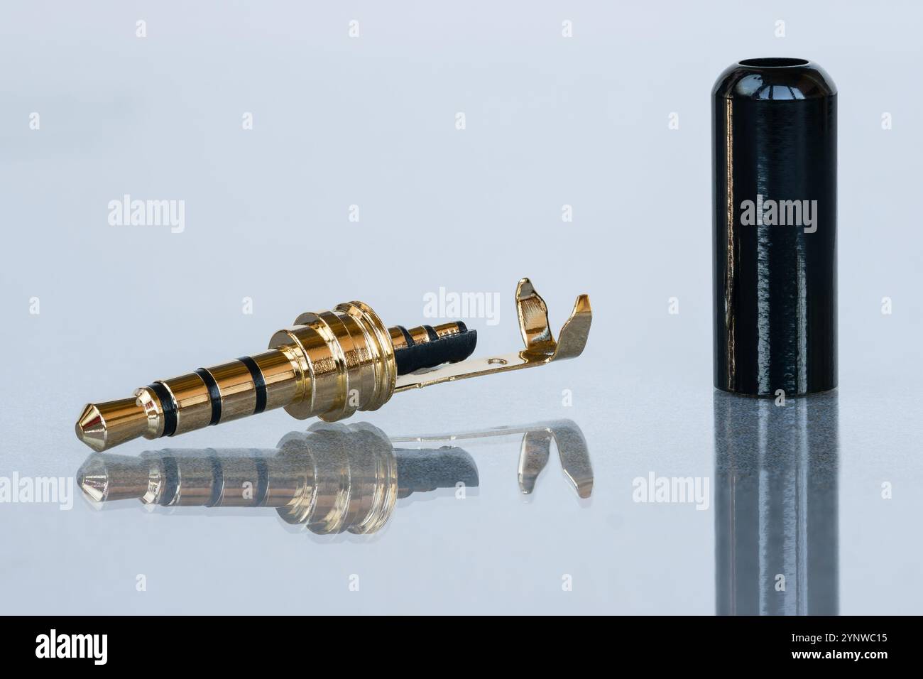 Macro shot of 4-pin disassembled gold plated mini jack connector for ...