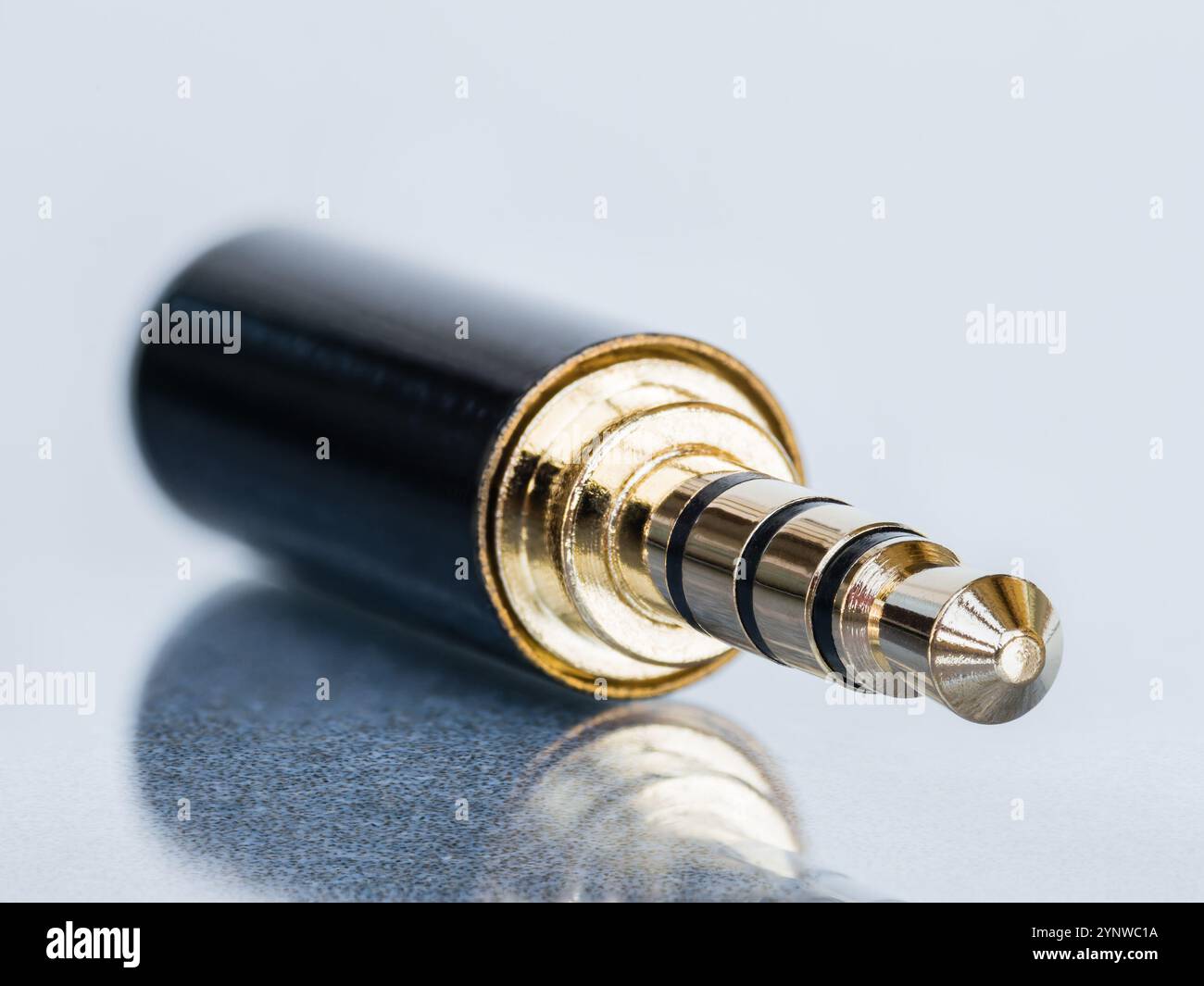 Macro shot of 4 pin gold plated mini jack connector for replacement ...