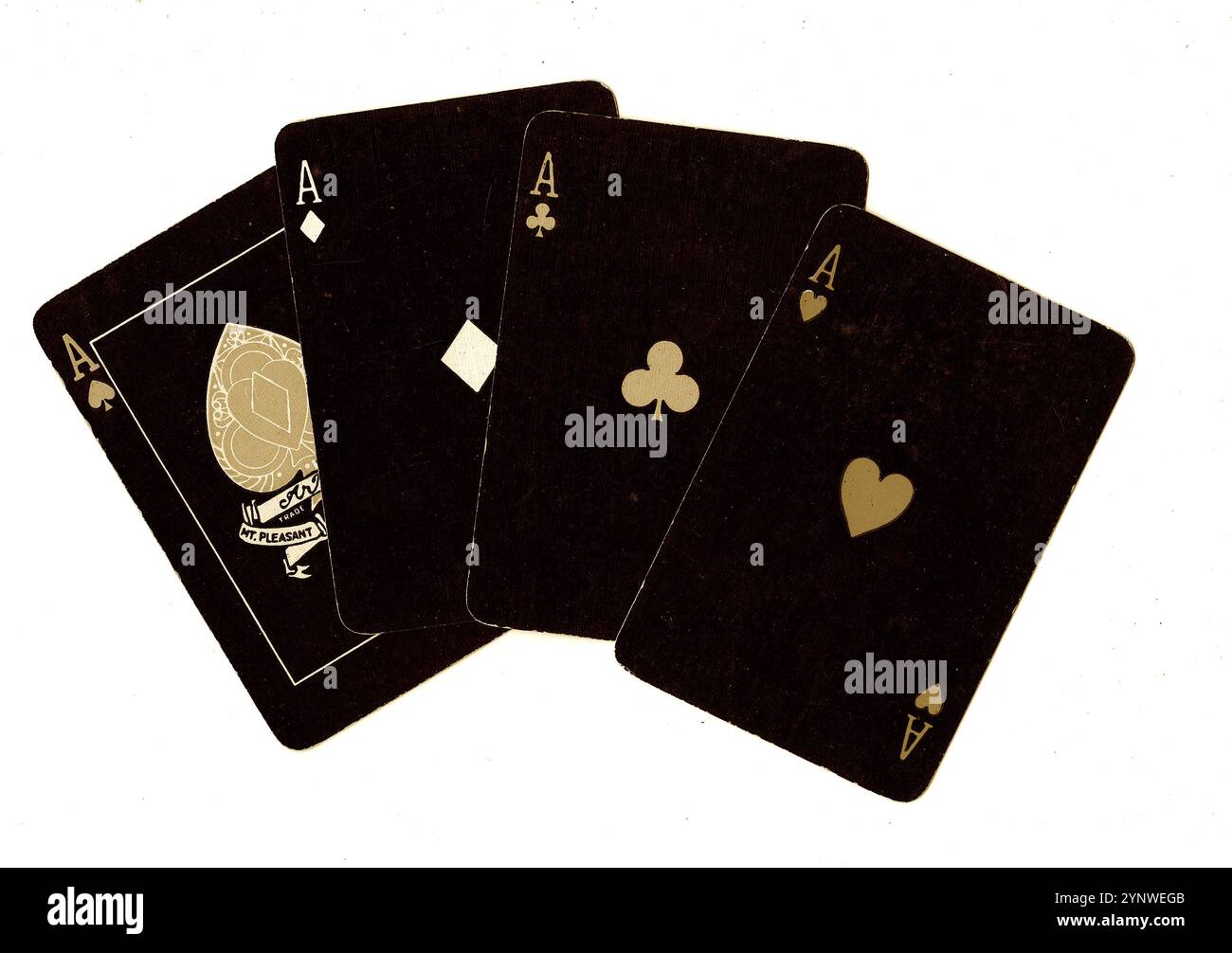 Vintage playing cards in gold and black showing four aces on a white ...