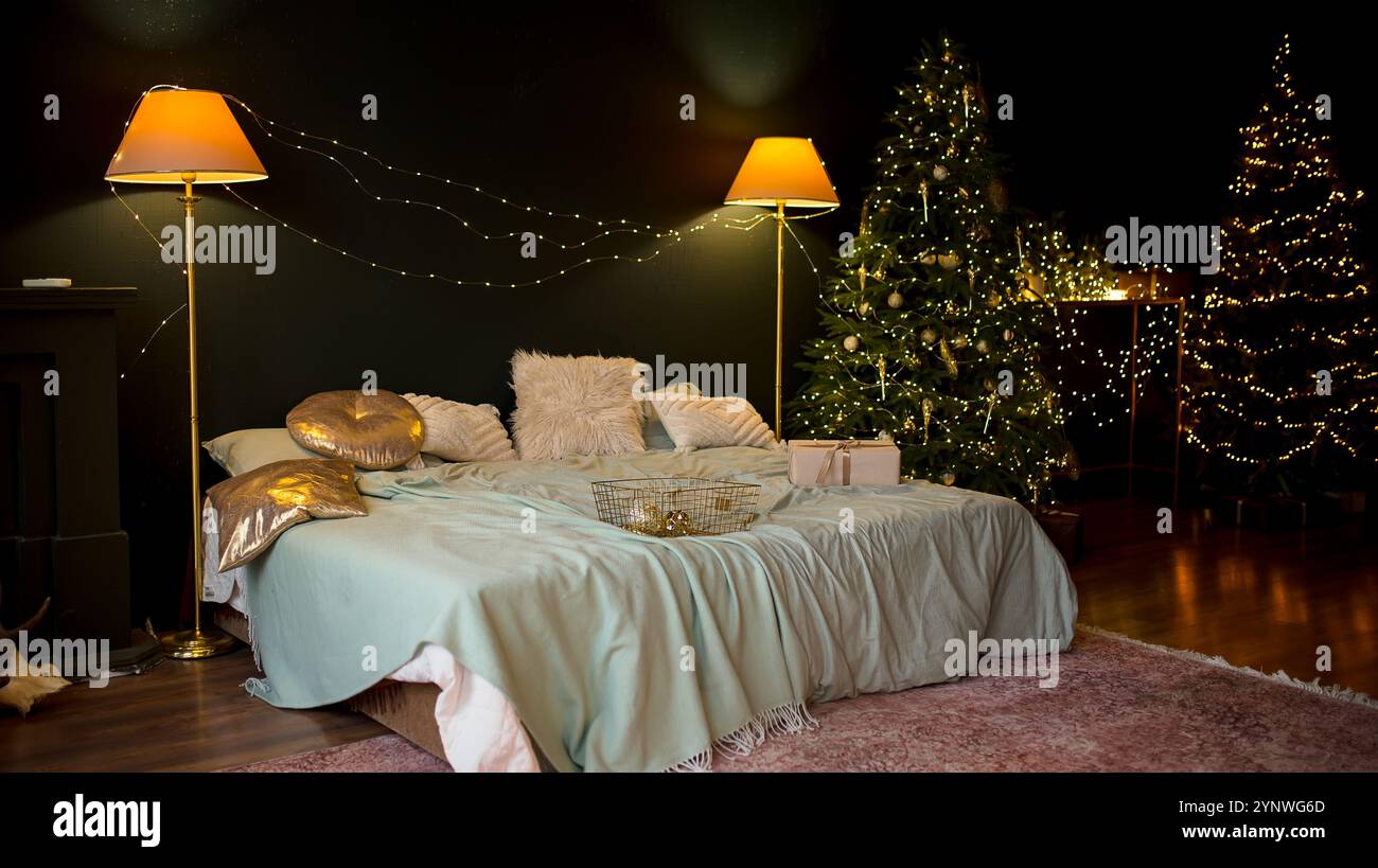 Decorated Christmas bedroom with Christmas tree. Light interior. Cozy ...