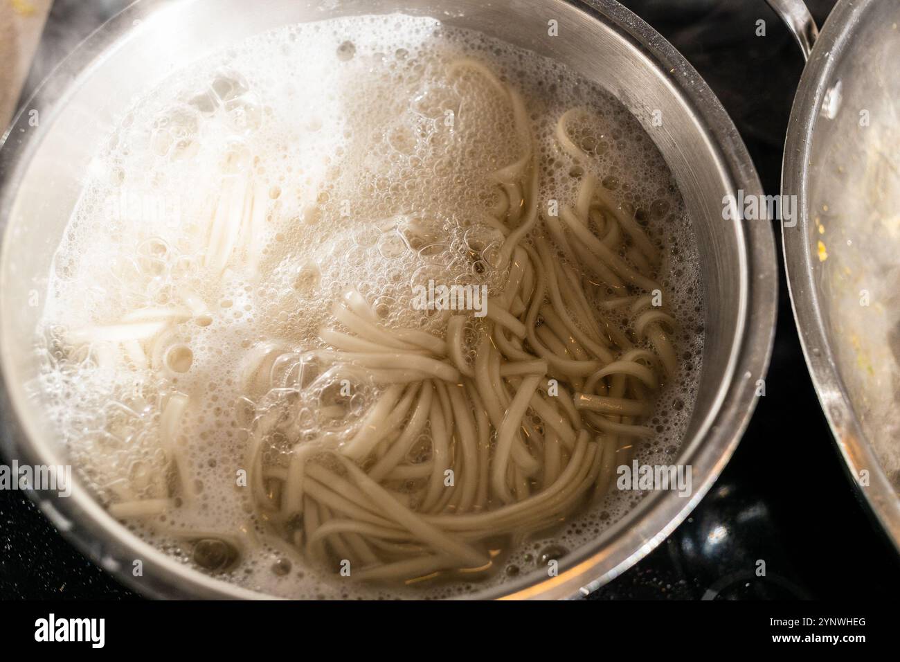 Boiling ramen noodles in pot hi-res stock photography and images - Alamy