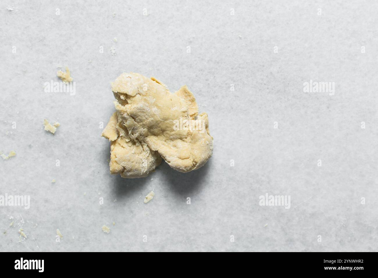 Overhead view of homemade pasta dough, top view pasta dough on a white ...