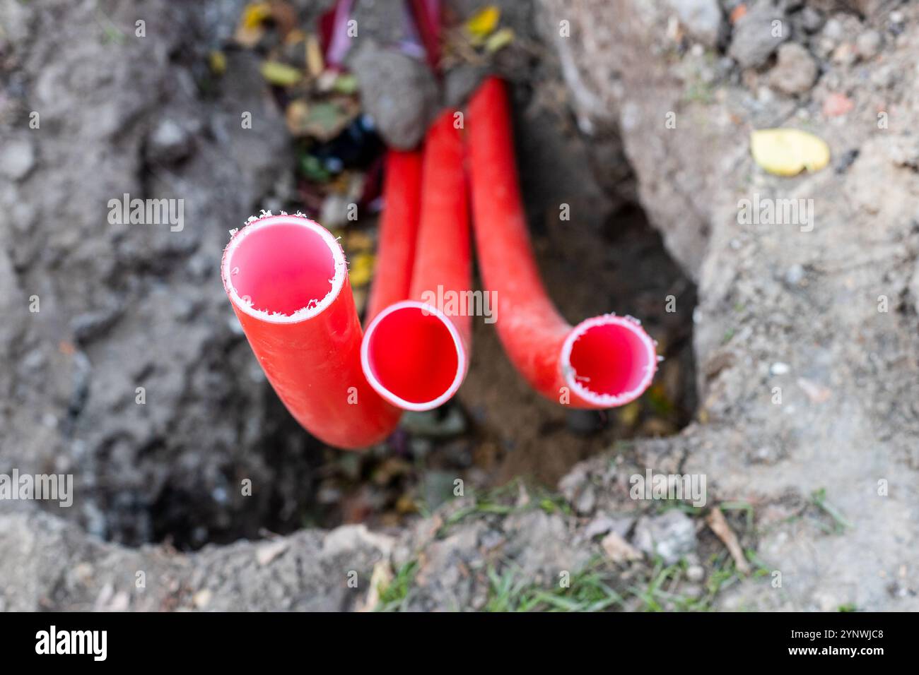 red plastic conduit pipes for outdoor underground electrical wiring in ...