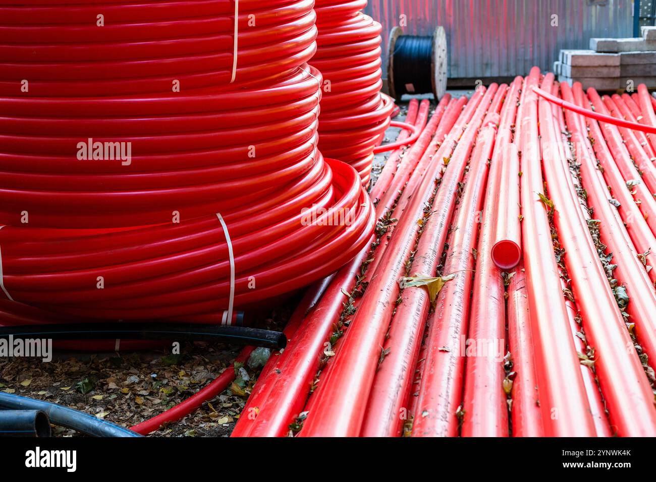 new red plastic conduit pipes for underground electrical wiring on ...