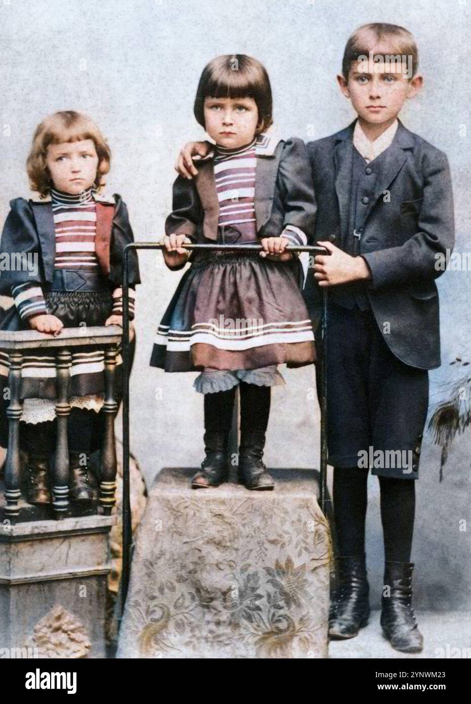 Franz Kafka (1883-1924) at about ten with his sisters Valli (left) and ...