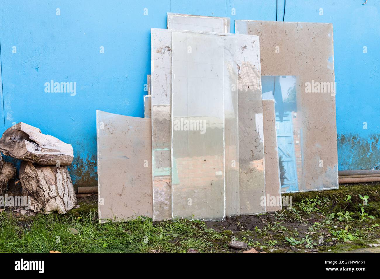 old dirty window panes stands in backyard of village house Stock Photo ...