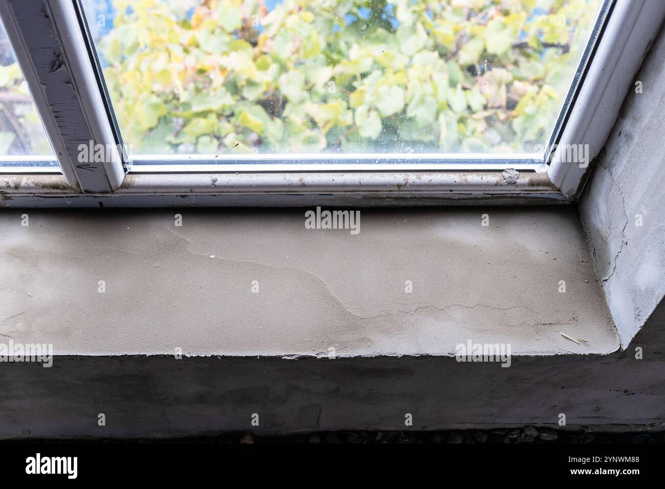 plastered window sill and window slopes in country house Stock Photo ...