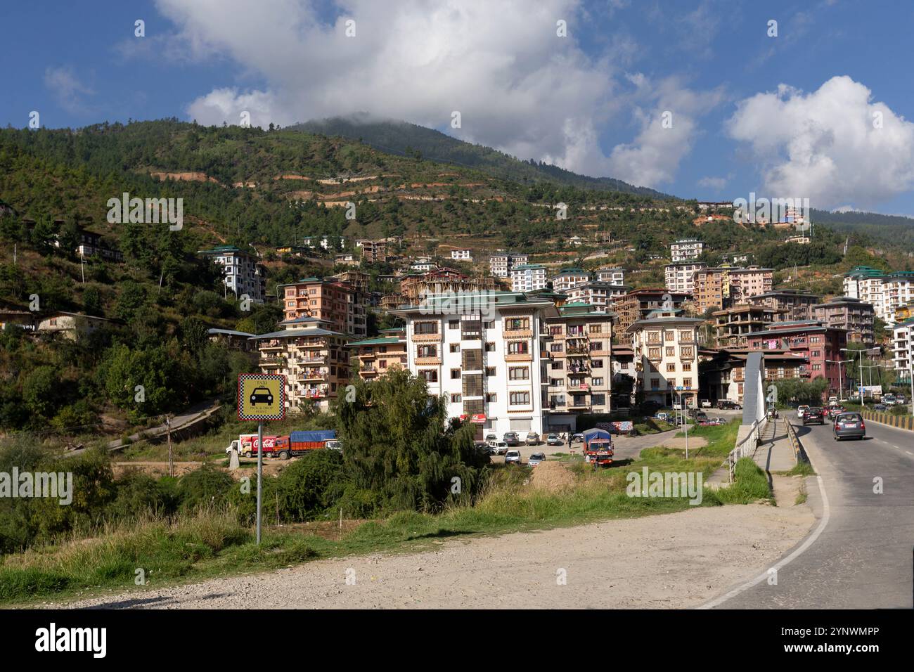 City's urban development, with rows of houses and buildings climbing up ...