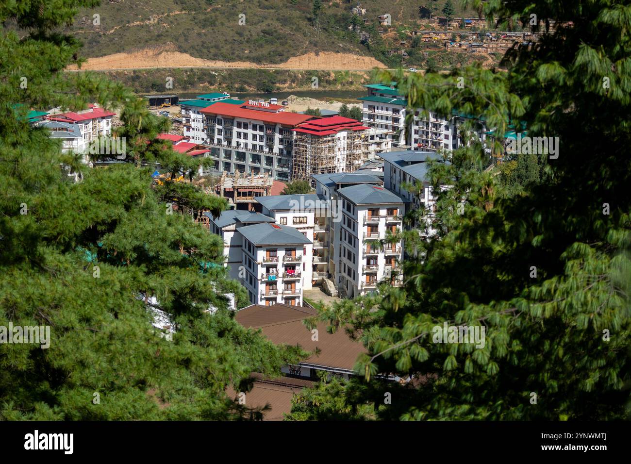 City's urban development, with rows of houses and buildings climbing up ...