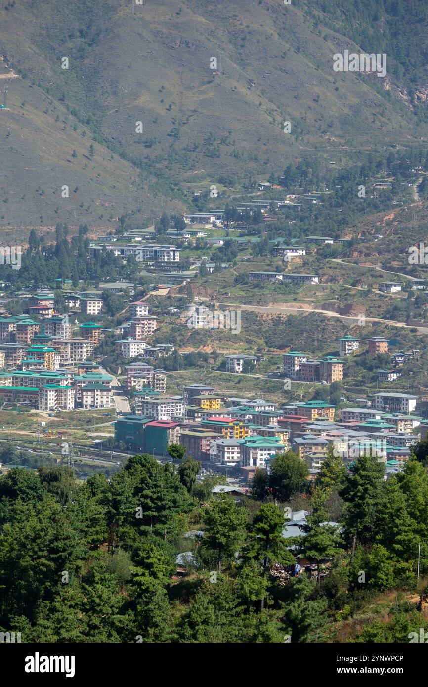 City's urban development, with rows of houses and buildings climbing up ...