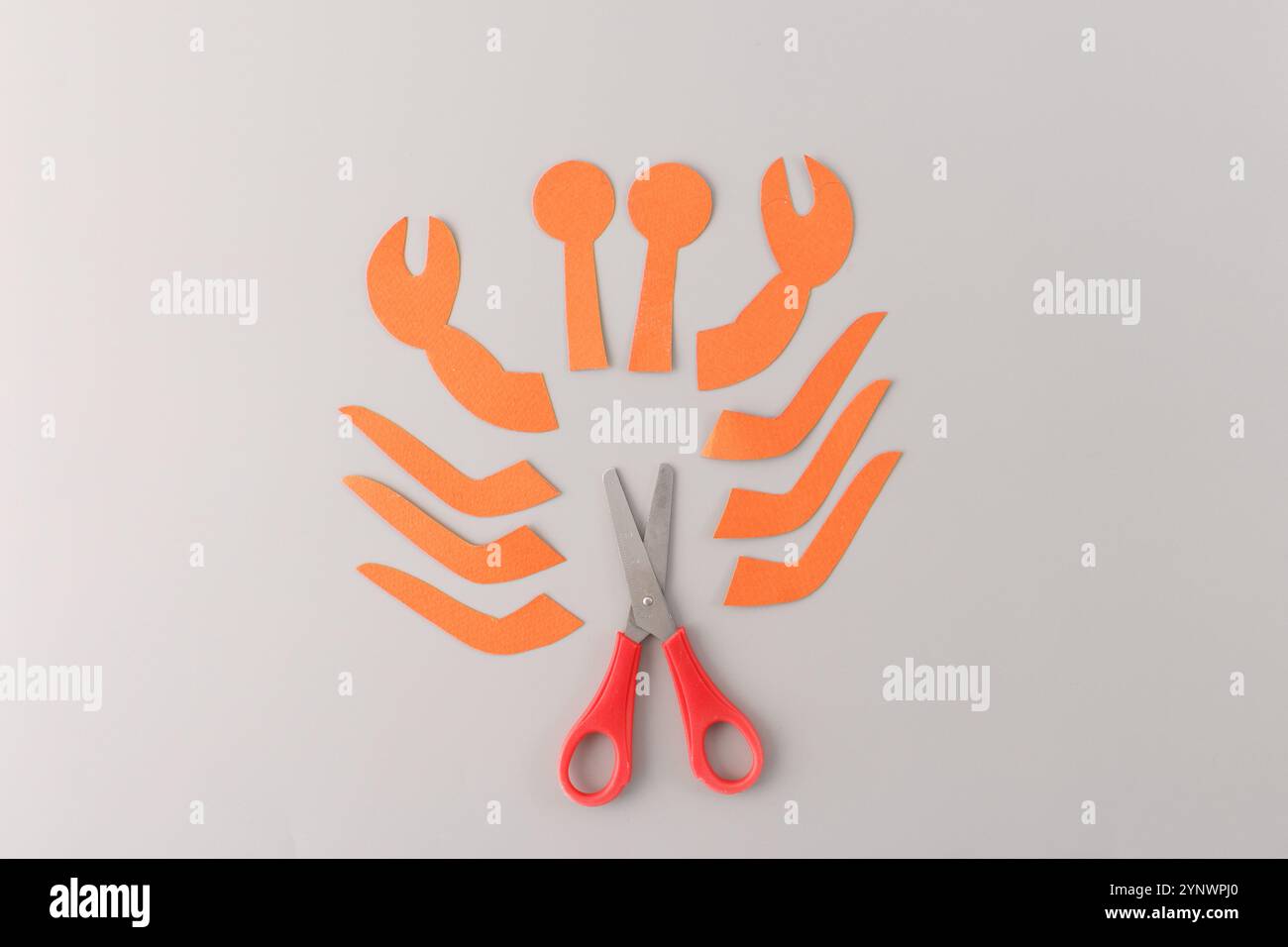 step in creative project, claws and legs made from orange paper, cut ...