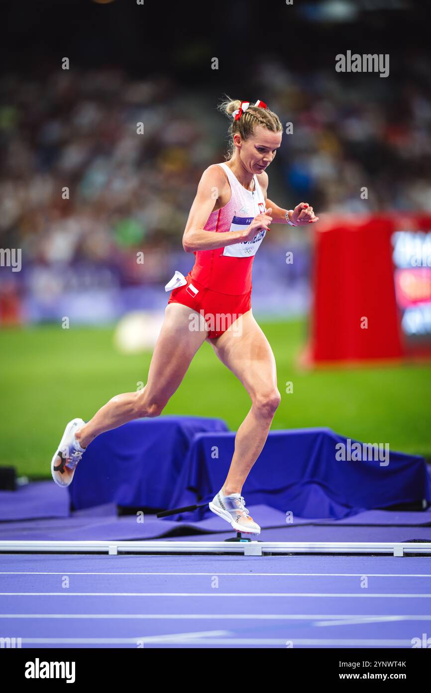 Alicja Konieczek participating in the 3000 metres steeplechase at the Paris 2024 Olympic Games ...