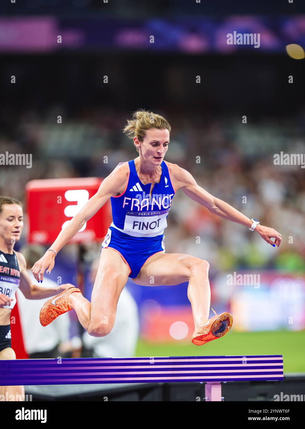 Alice Finot participating in the 3000 metres steeplechase at the Paris ...