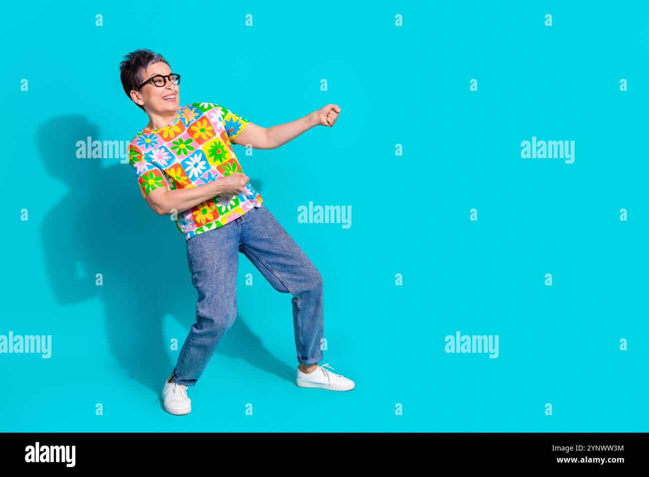 Full length portrait of pretty aged lady pull empty space rope isolated ...