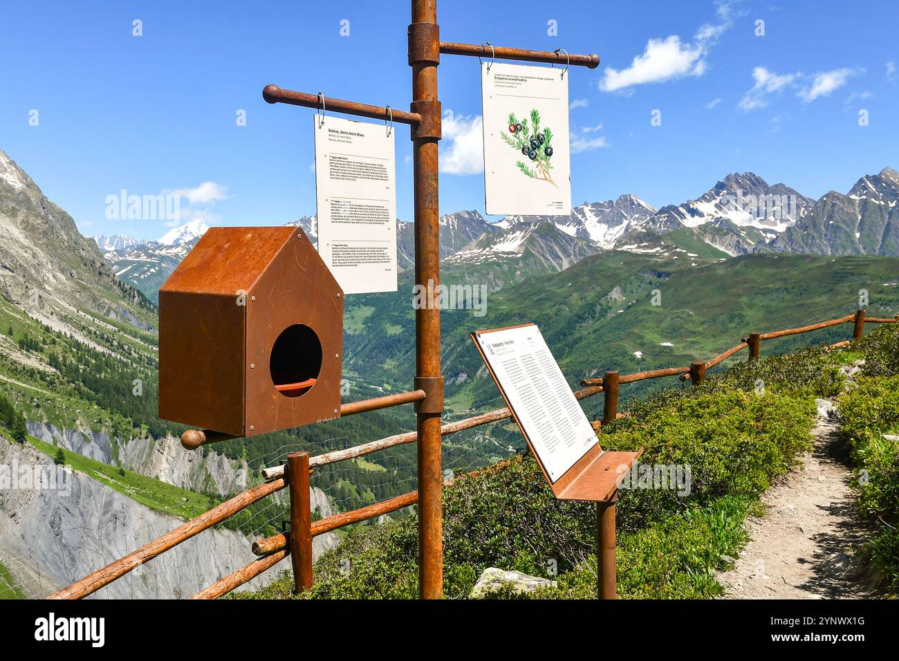 Bird house and educational signs in the Alpine Botanical Garden ...