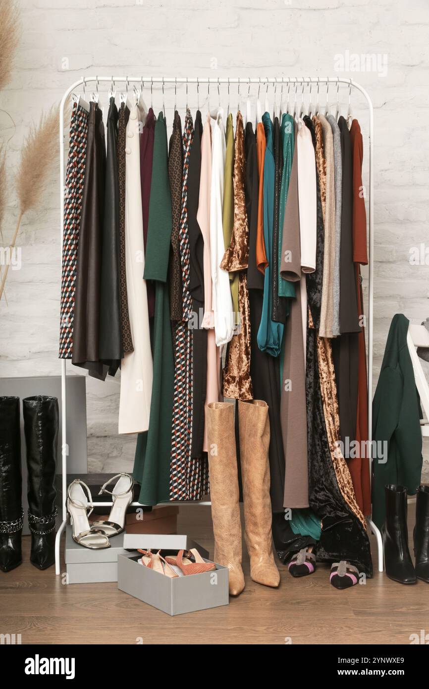 Stylish clothes hanging in hi-res stock photography and images - Alamy