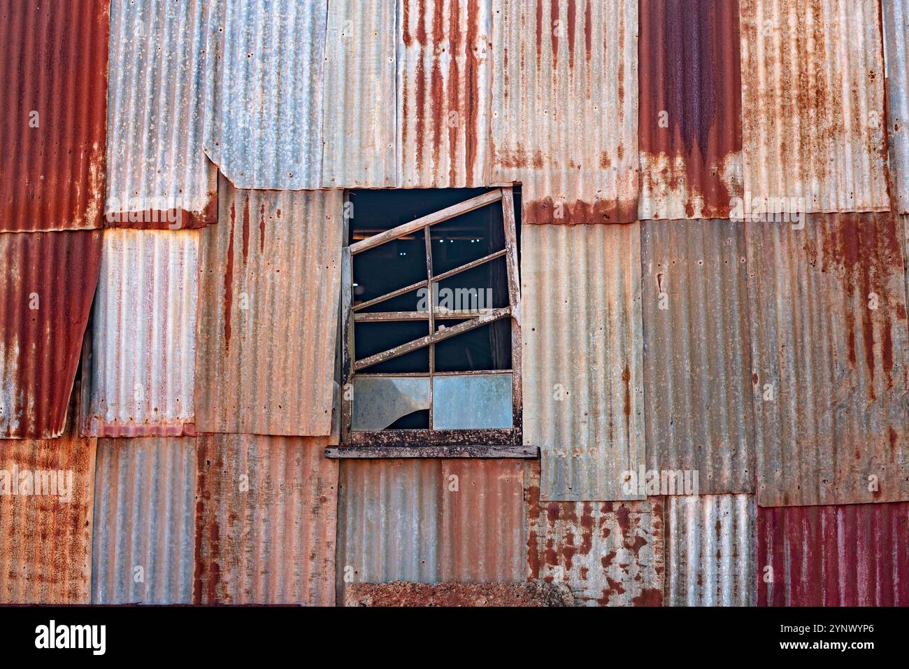 Broken window rusted shed, derelict building wall, with rusty ...