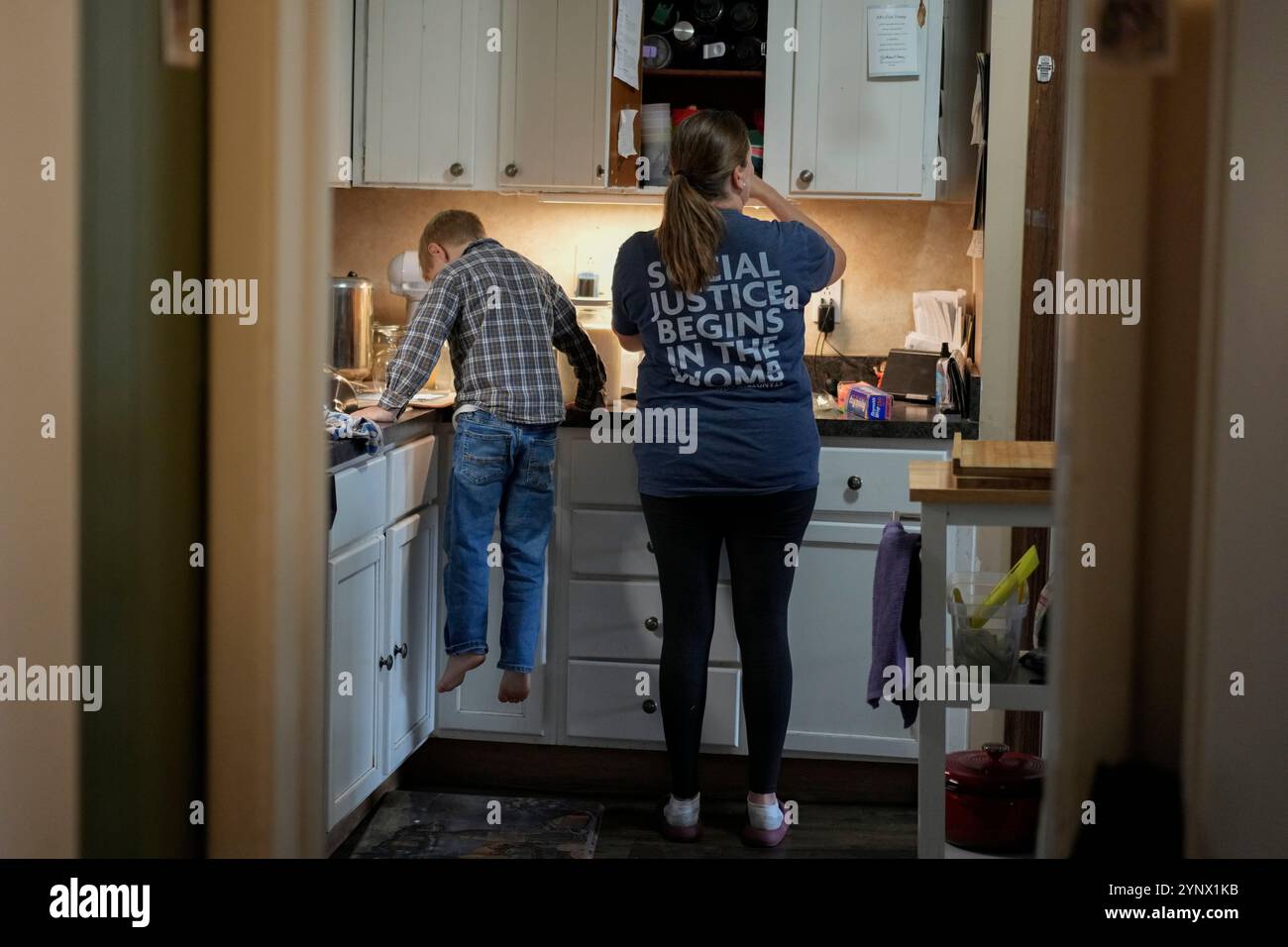 Erin Young wears a T-shirt that reads "Social Justice Begins in the ...