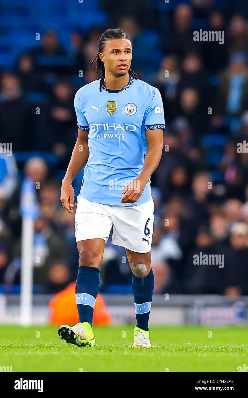 Manchester, UK. 26th Nov, 2024. Nathan Ake of Manchester City during ...