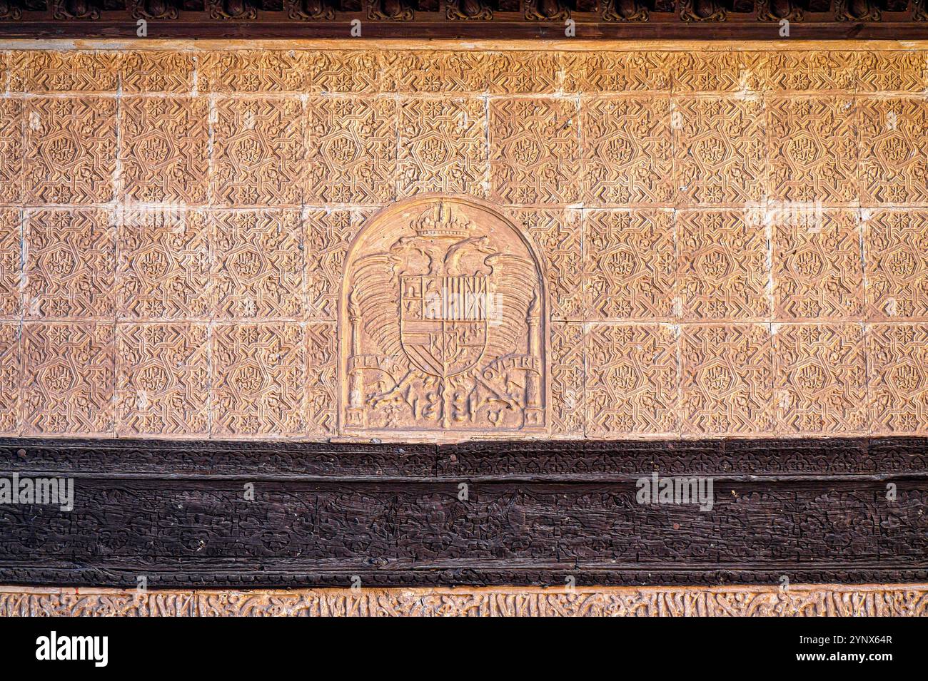 Granada, Spain - July 17, 2024: Ancient coat of arms and pattern ...
