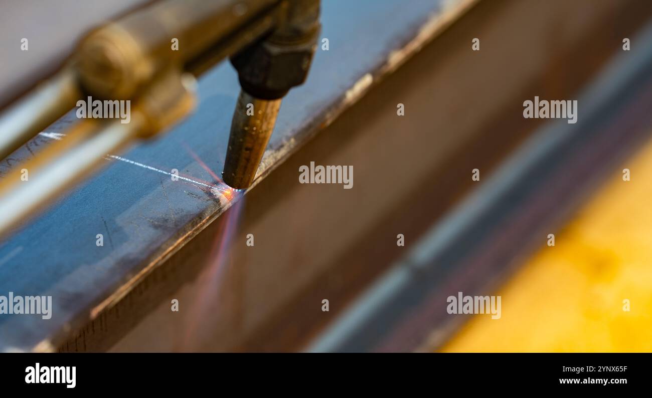 Metal being cut with a torch. Gas cutting metal. Precision and control ...