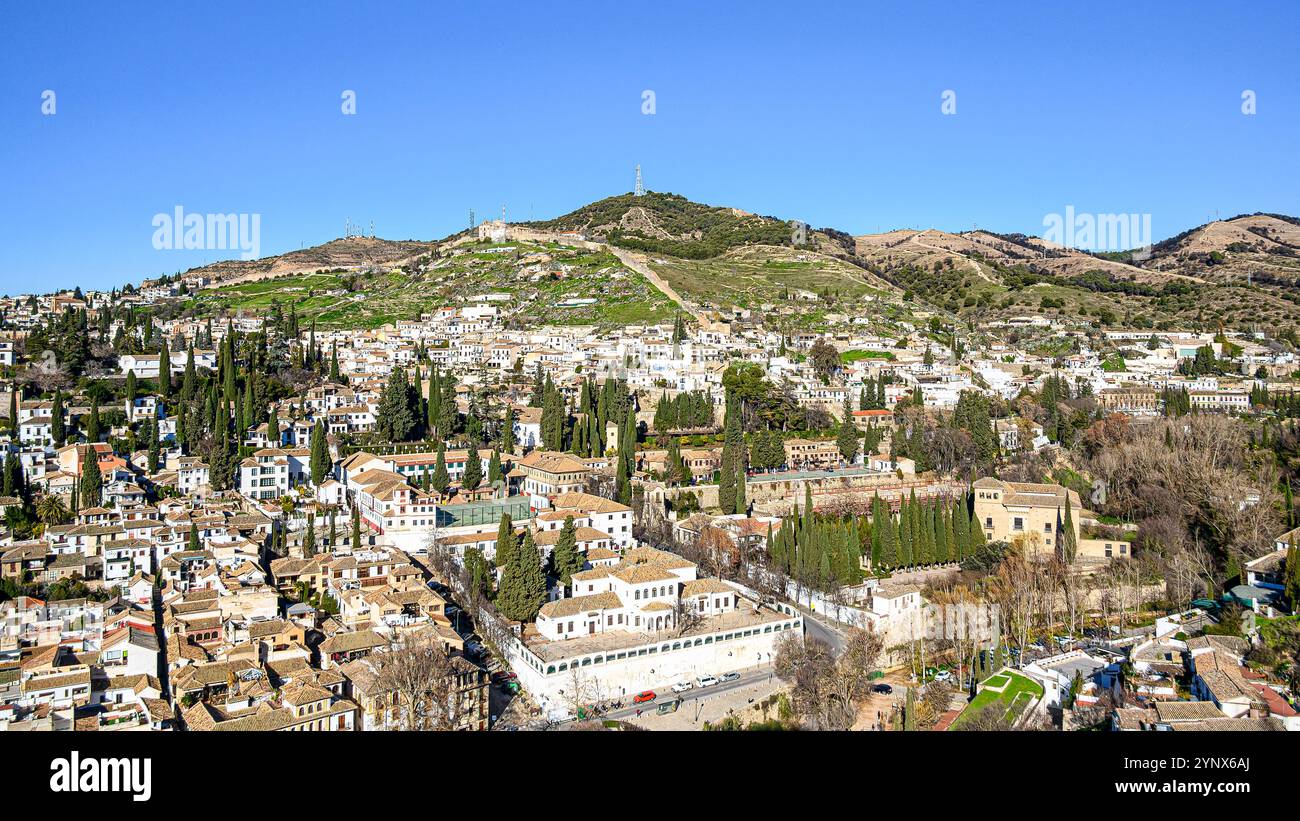 Granada, Spain - July 17, 2024: Cityscape with diverse buildings and ...