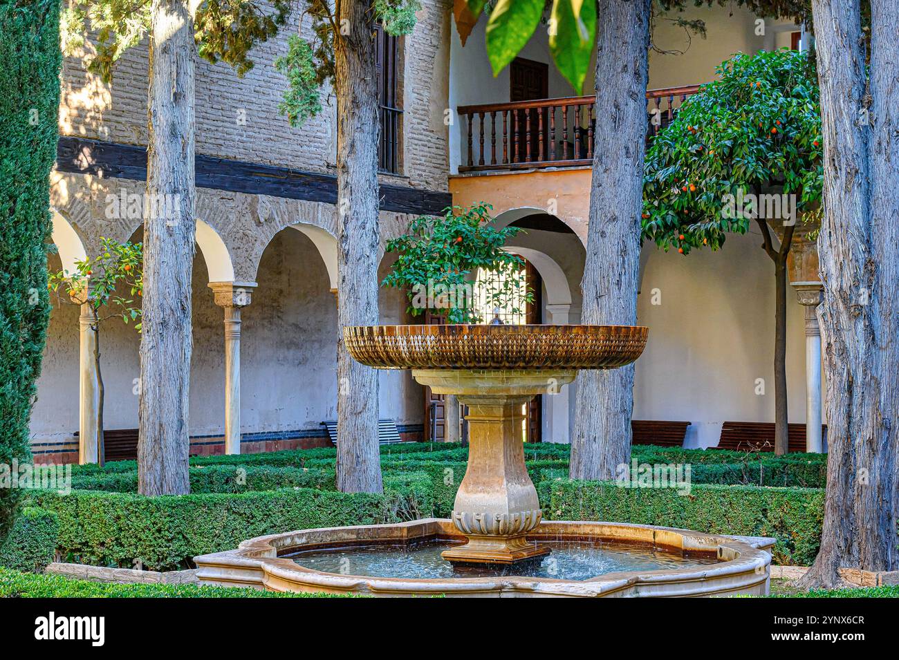 Granada, Spain - July 17, 2024: Ancient water fountain in a courtyard ...