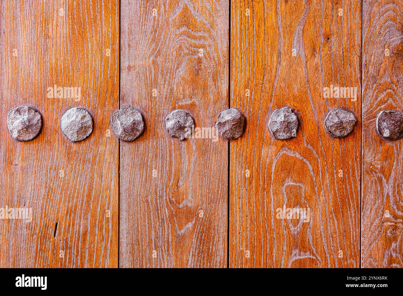 Granada, Spain - July 17, 2024: Details of medieval metallic rivets on ...