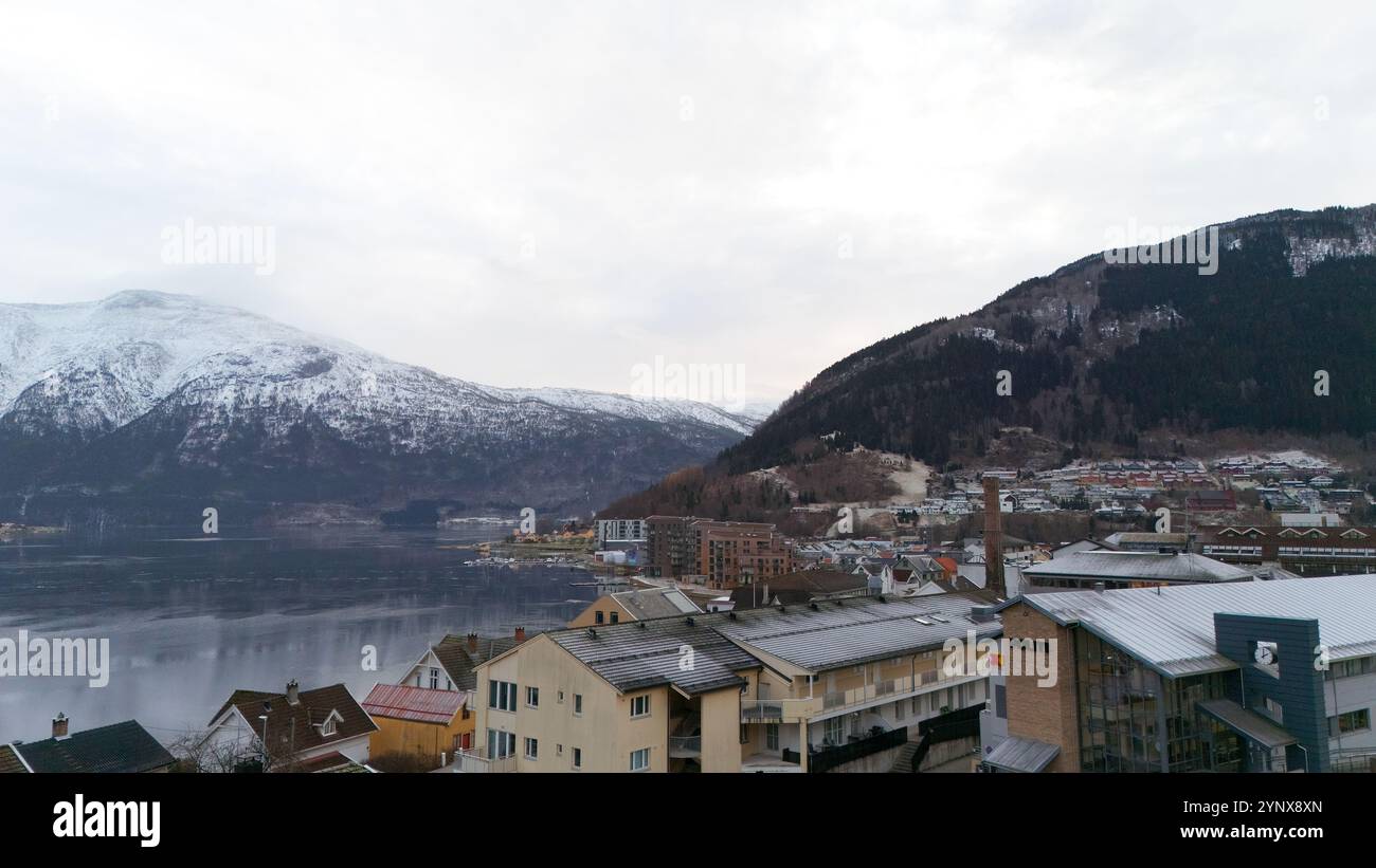 Snowy Sogndal, Norway with Stunning Mountain Views and Calm Fjordside Scenery Stock Photo - Alamy