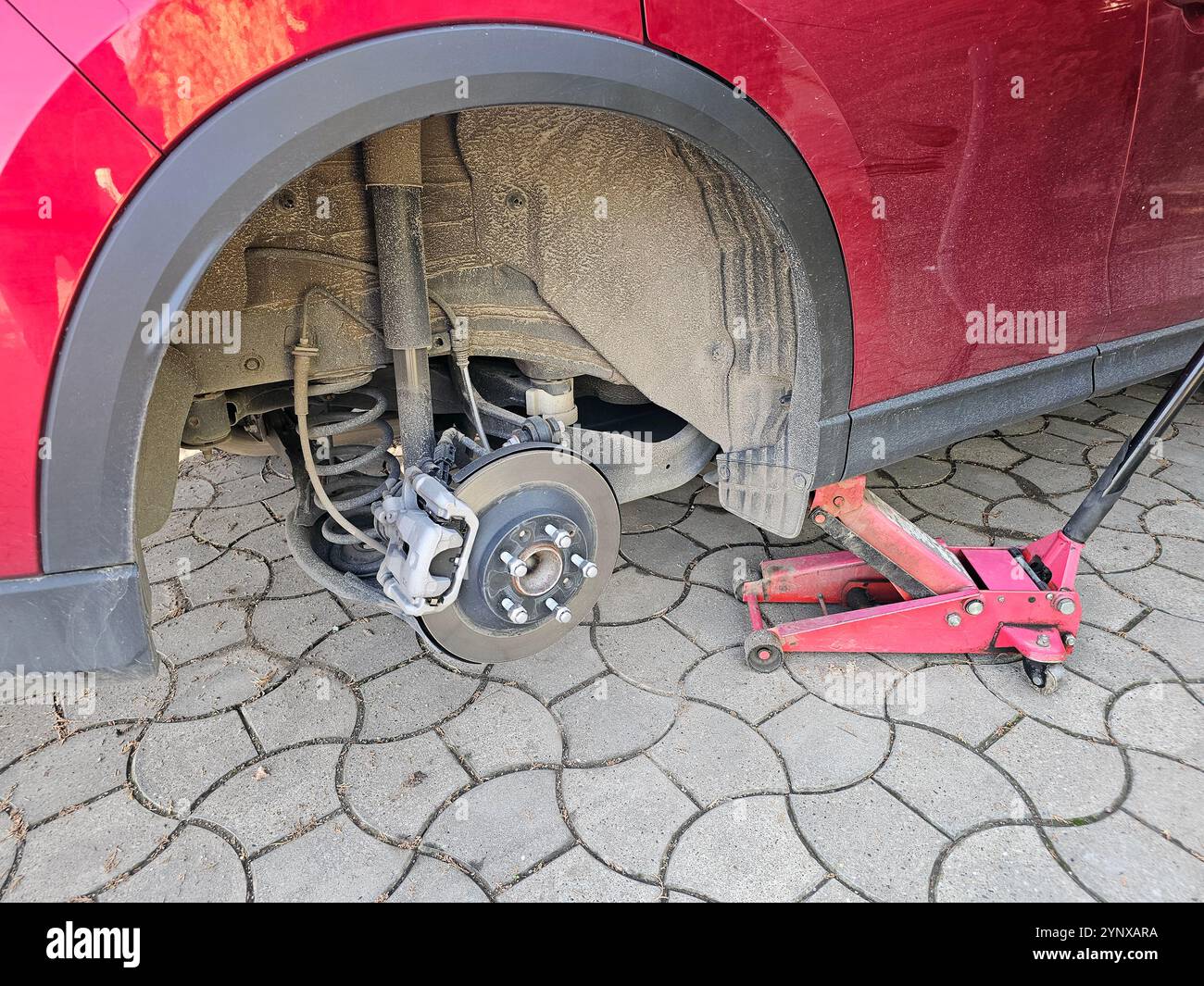 Tyre repair scene, emergency changing tyres, tyre fitting with air ...