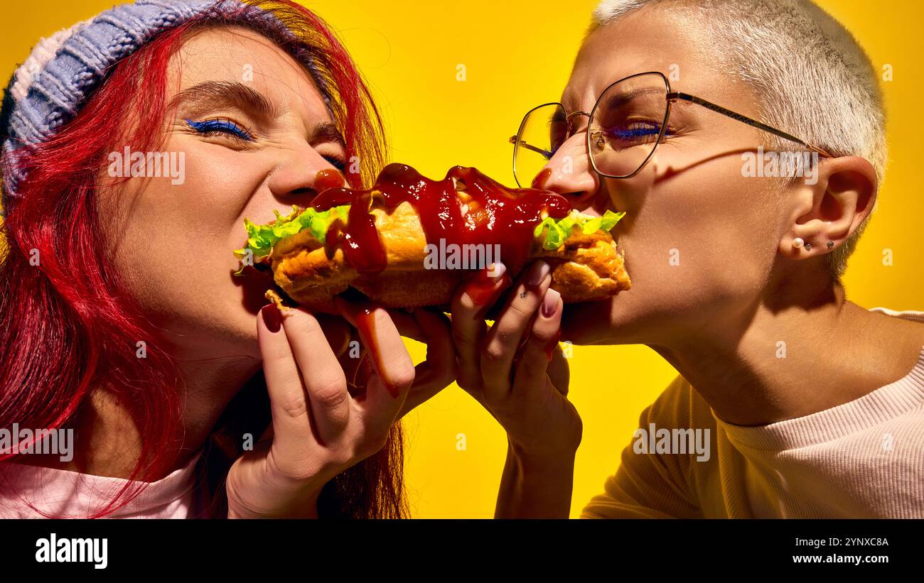Super delicious street food. Two women emotional and passionately ...