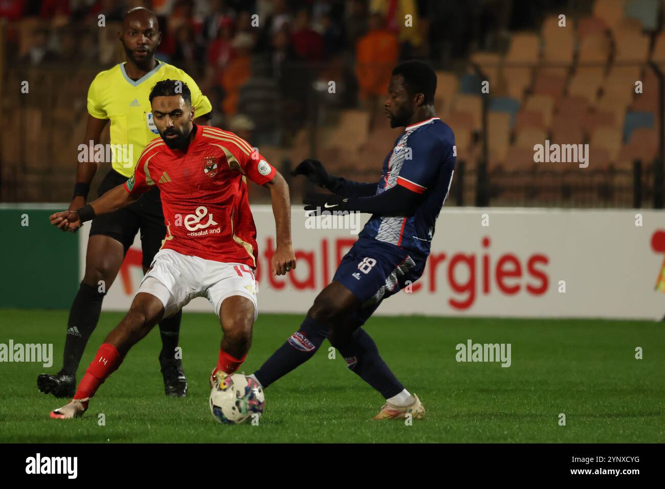 EGYPT, CAIRO, 26 NOVEMBER 2024 : Hussein El Shahat of Al Ahly SC and Essis Aka of Stade d ...
