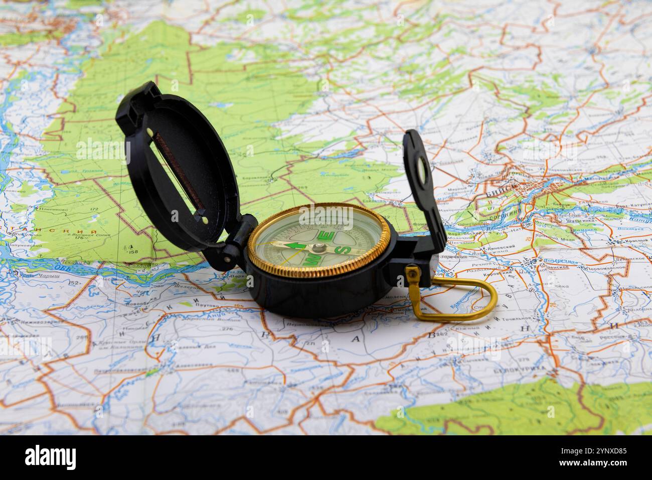Compass lies on map hi-res stock photography and images - Alamy