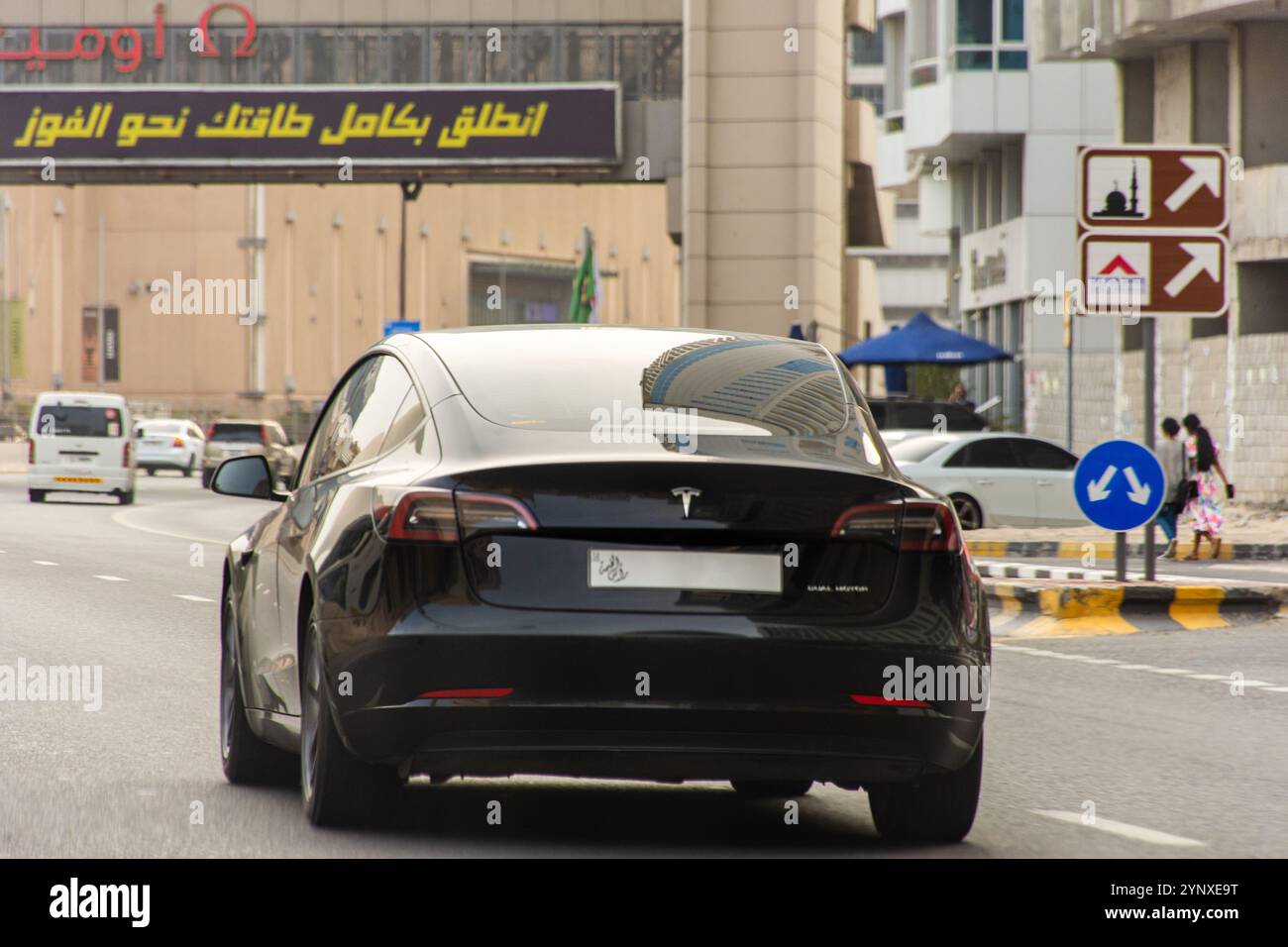 Black Tesla Model 3 on the highway in Sharjah City, United Arab ...