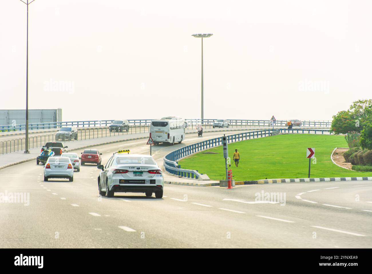 Aman taxi on the road in Sharjah City, United Arab Emirates Stock Photo ...