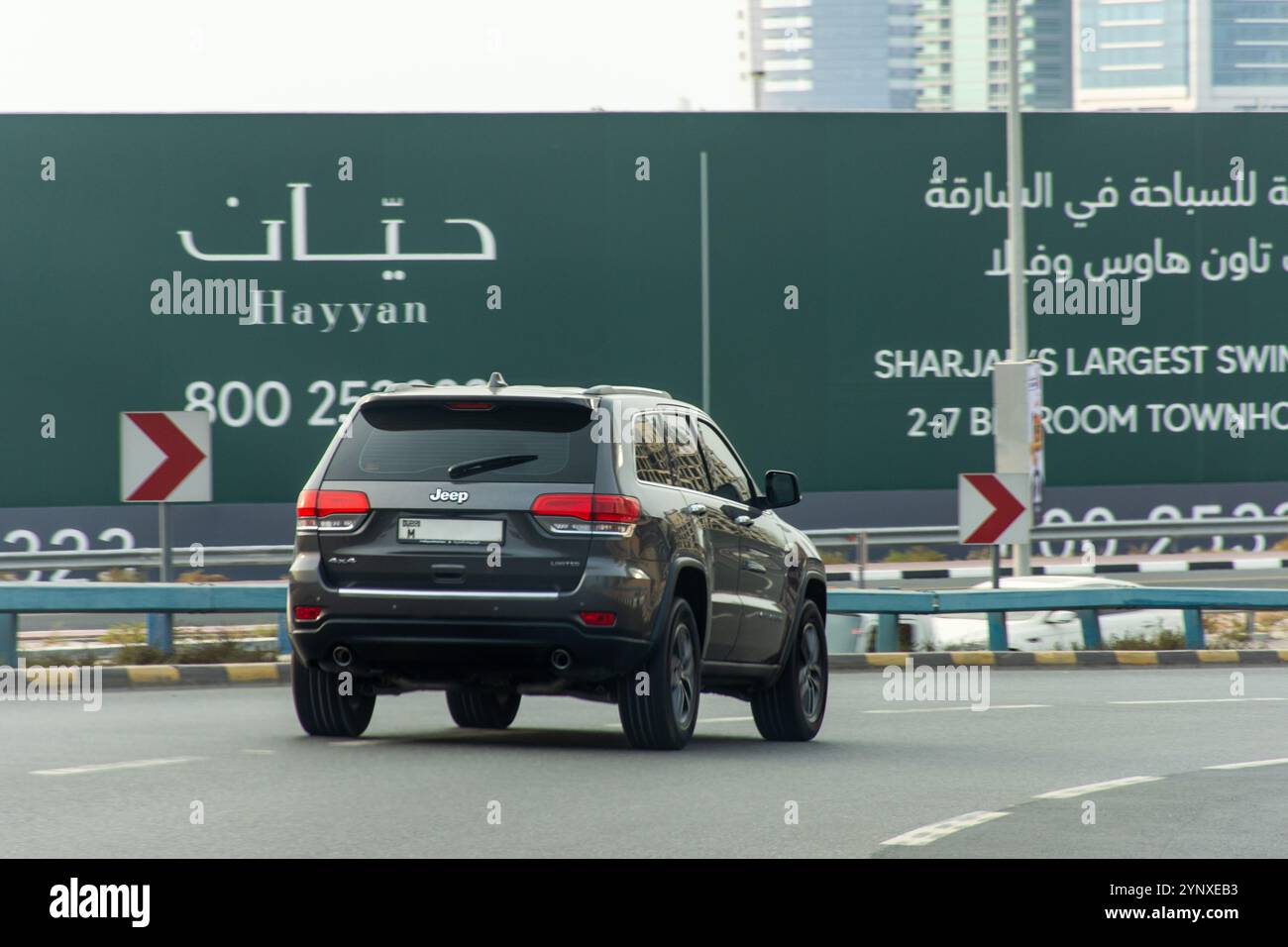 Jeep Grand Cherokee on the highway in Sharjah City, United Arab ...